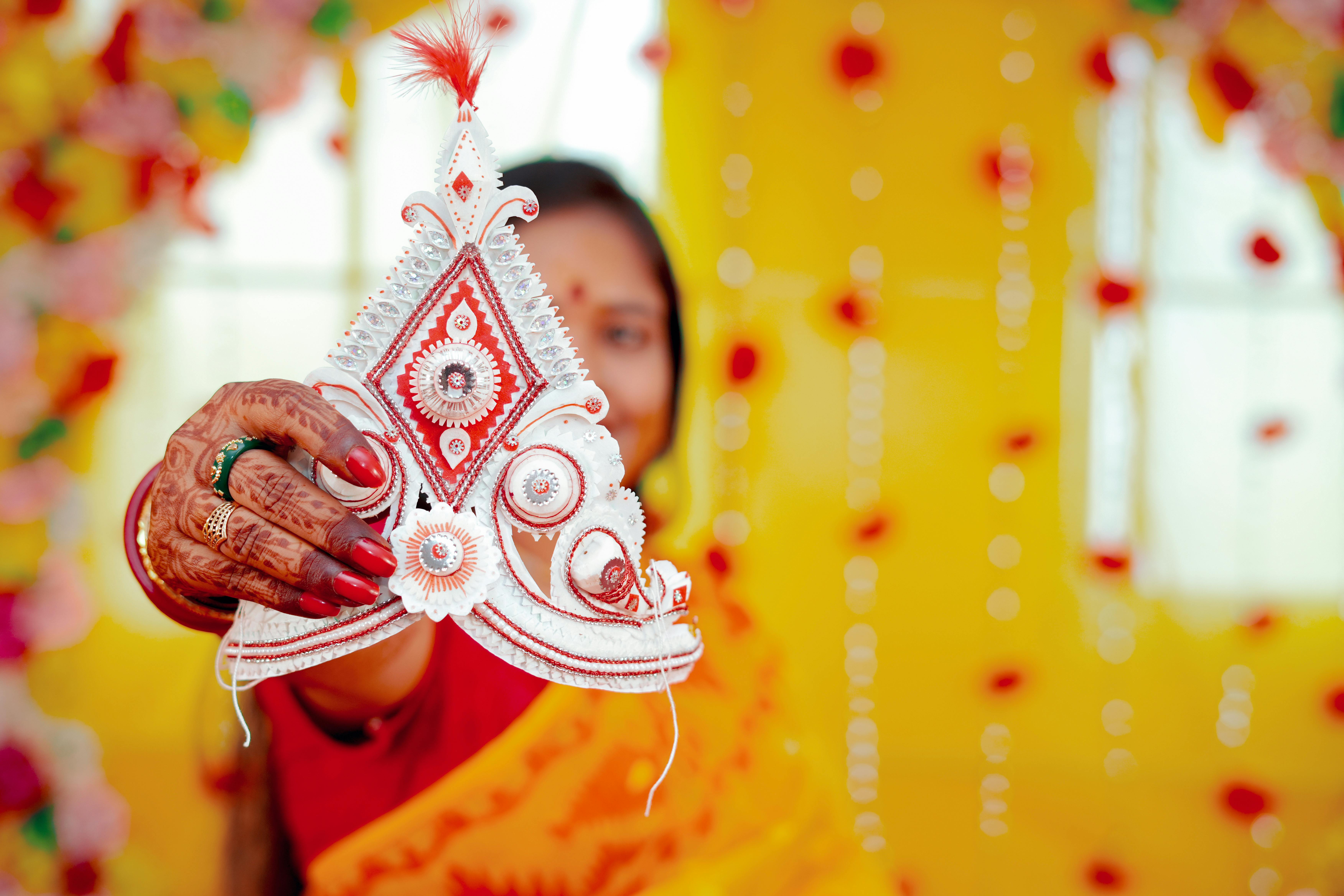 Bengali Bride Holding Traditional Mukut in Ceremony · Free Stock Photo