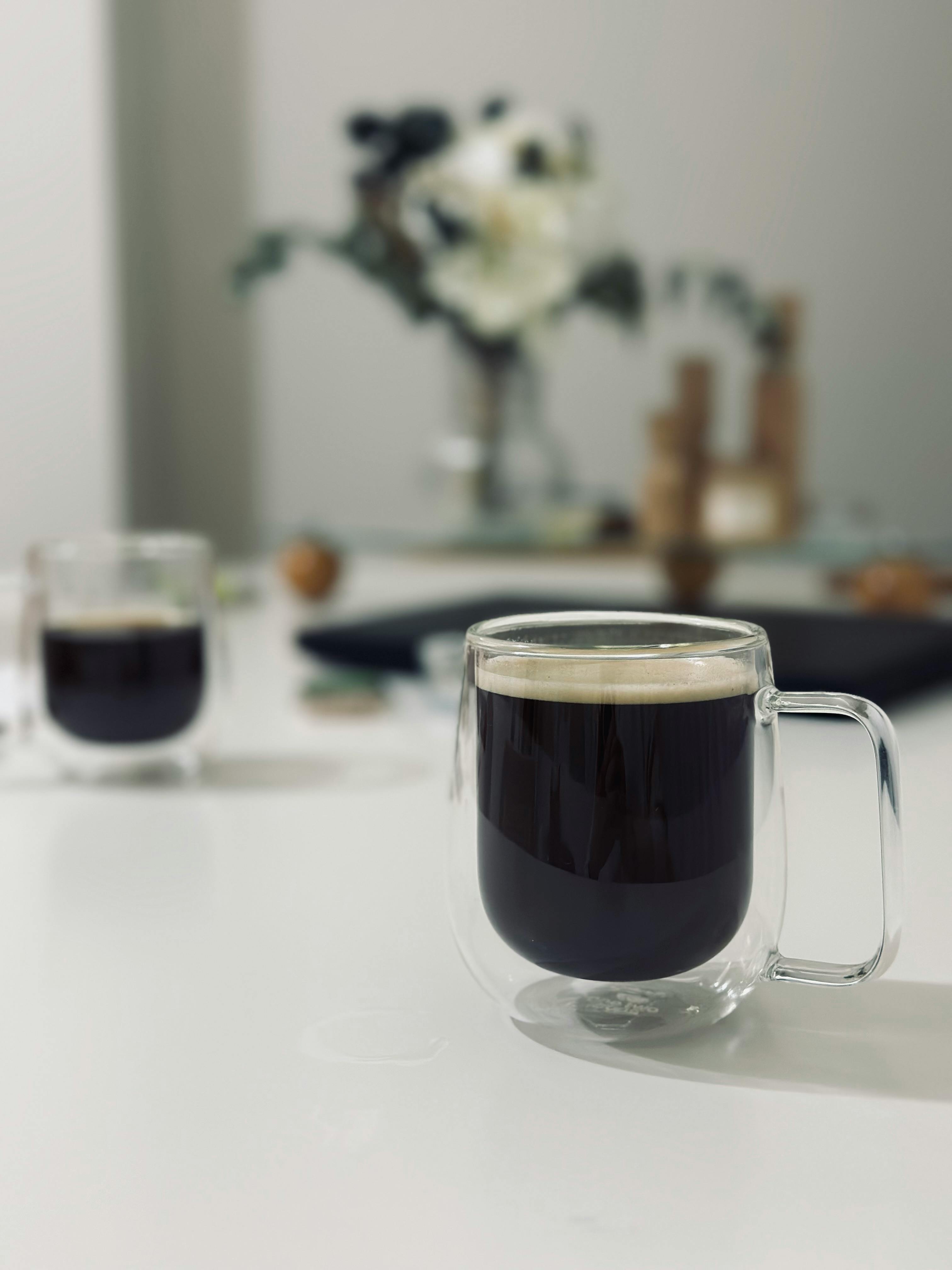 Minimalist Coffee Cups Setup on Modern Table · Free Stock Photo