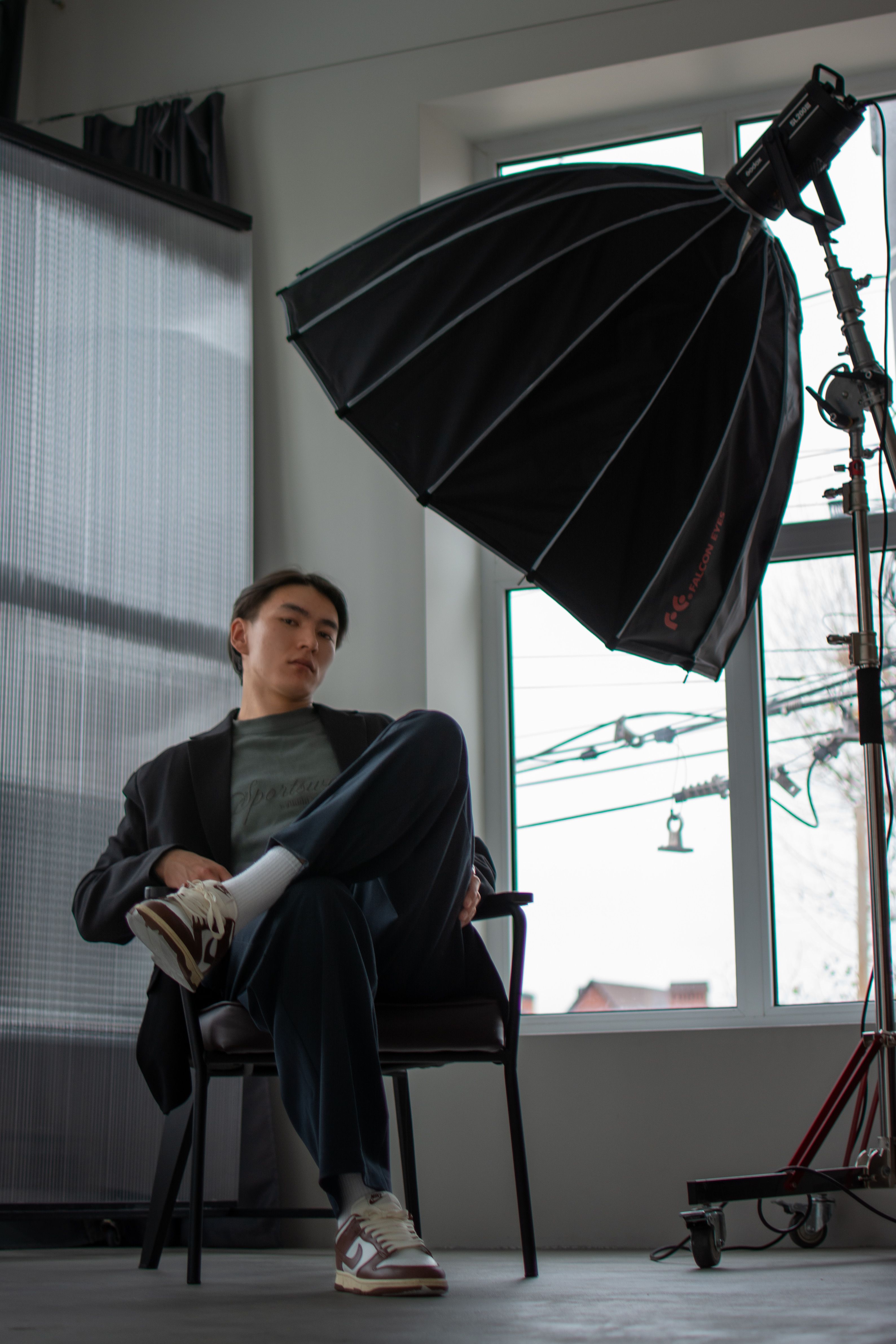 Portrait of a Man in Photography Studio Setting · Free Stock Photo