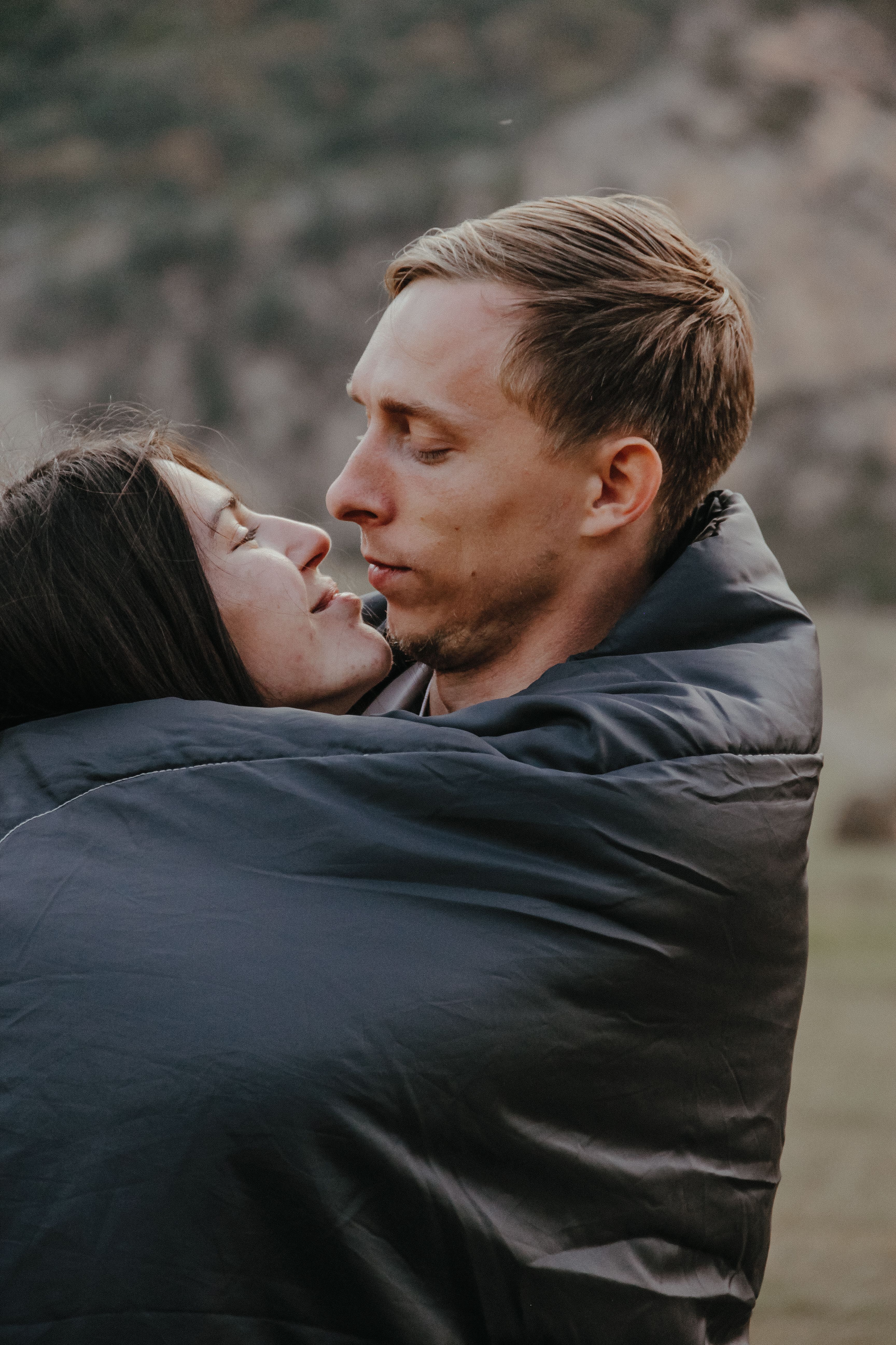A Couple Sharing a Blanket · Free Stock Photo
