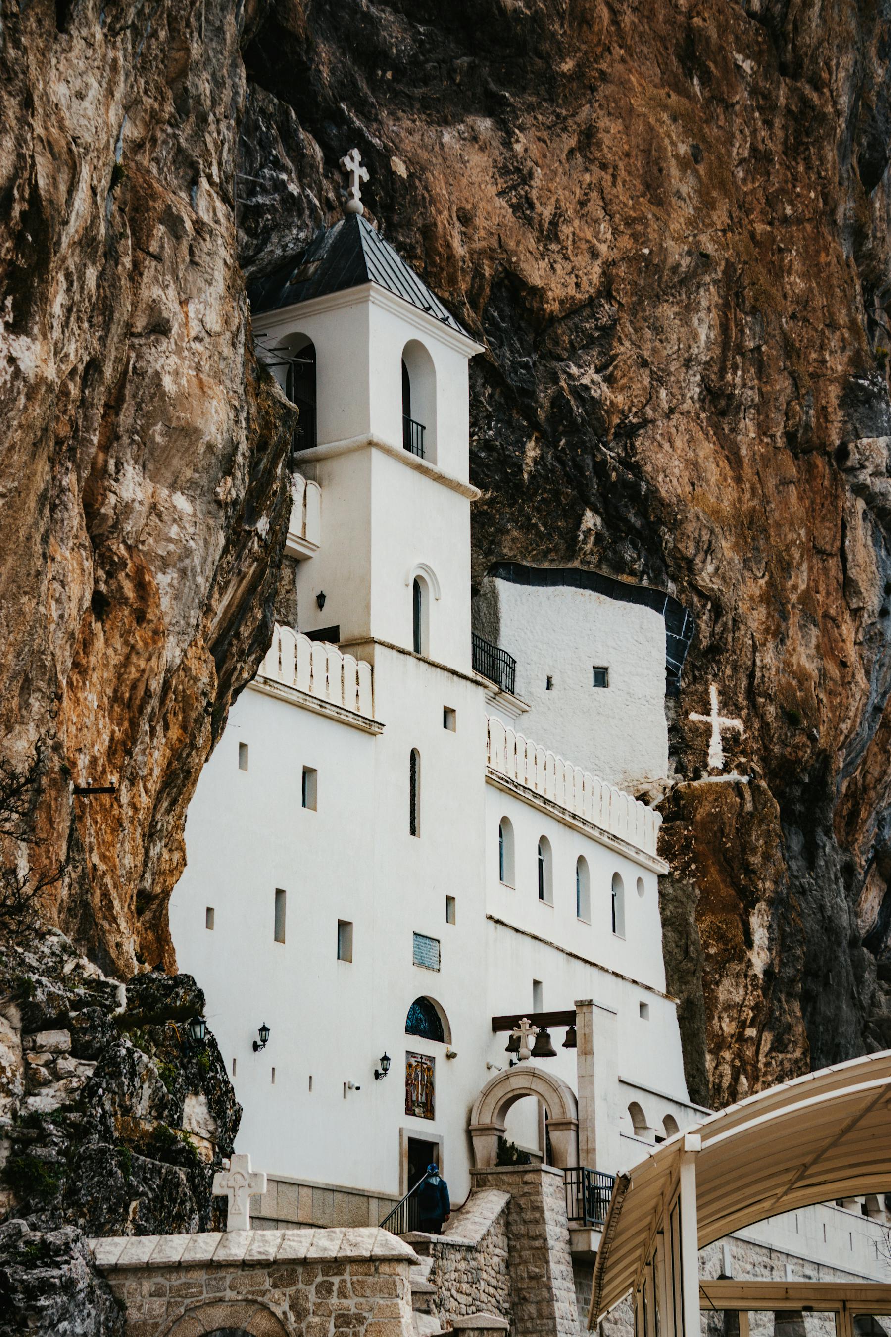 White Monastery Built into Rock Face in Montenegro · Free Stock Photo