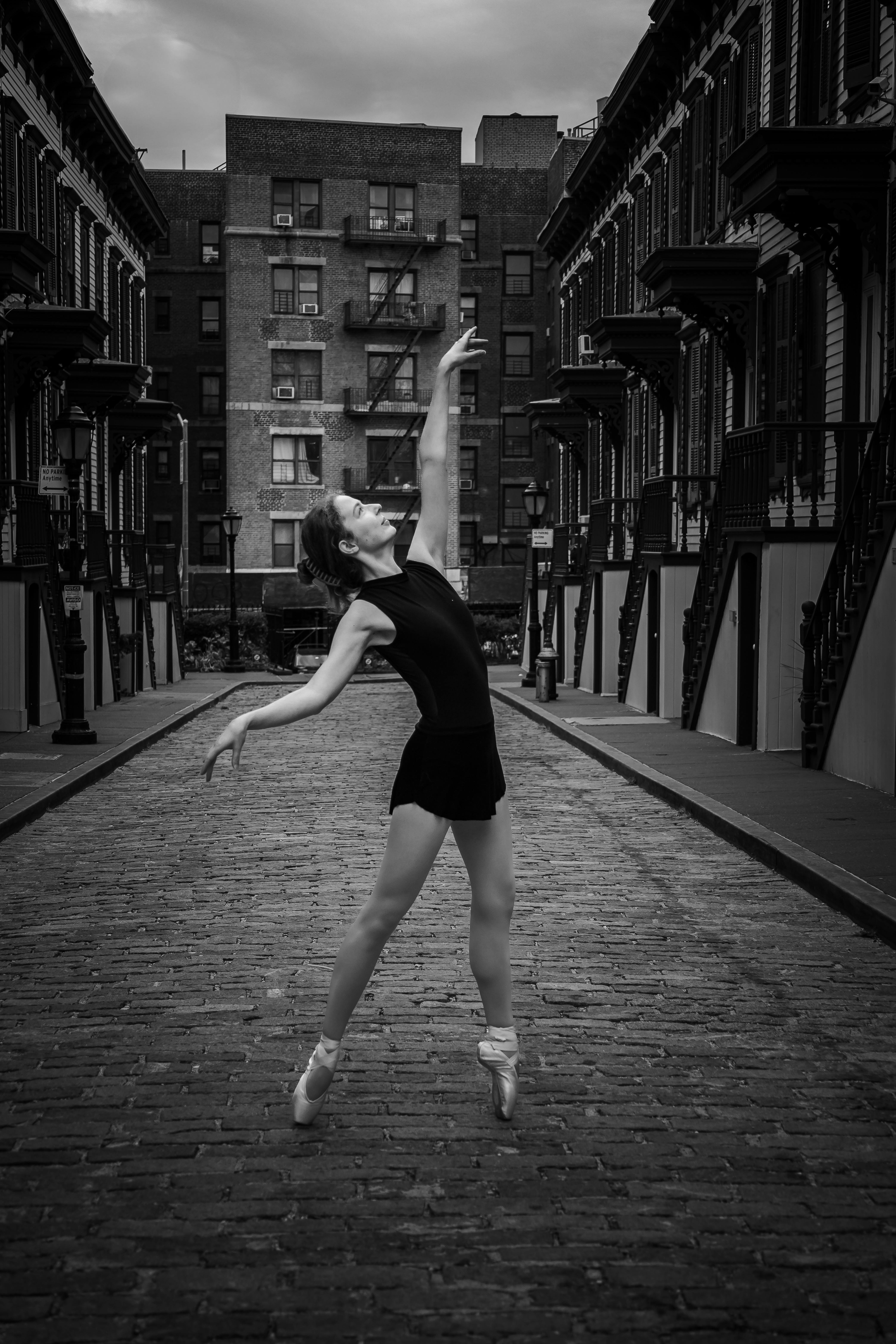 Elegant Ballet Dancer in Urban Alleyway · Free Stock Photo