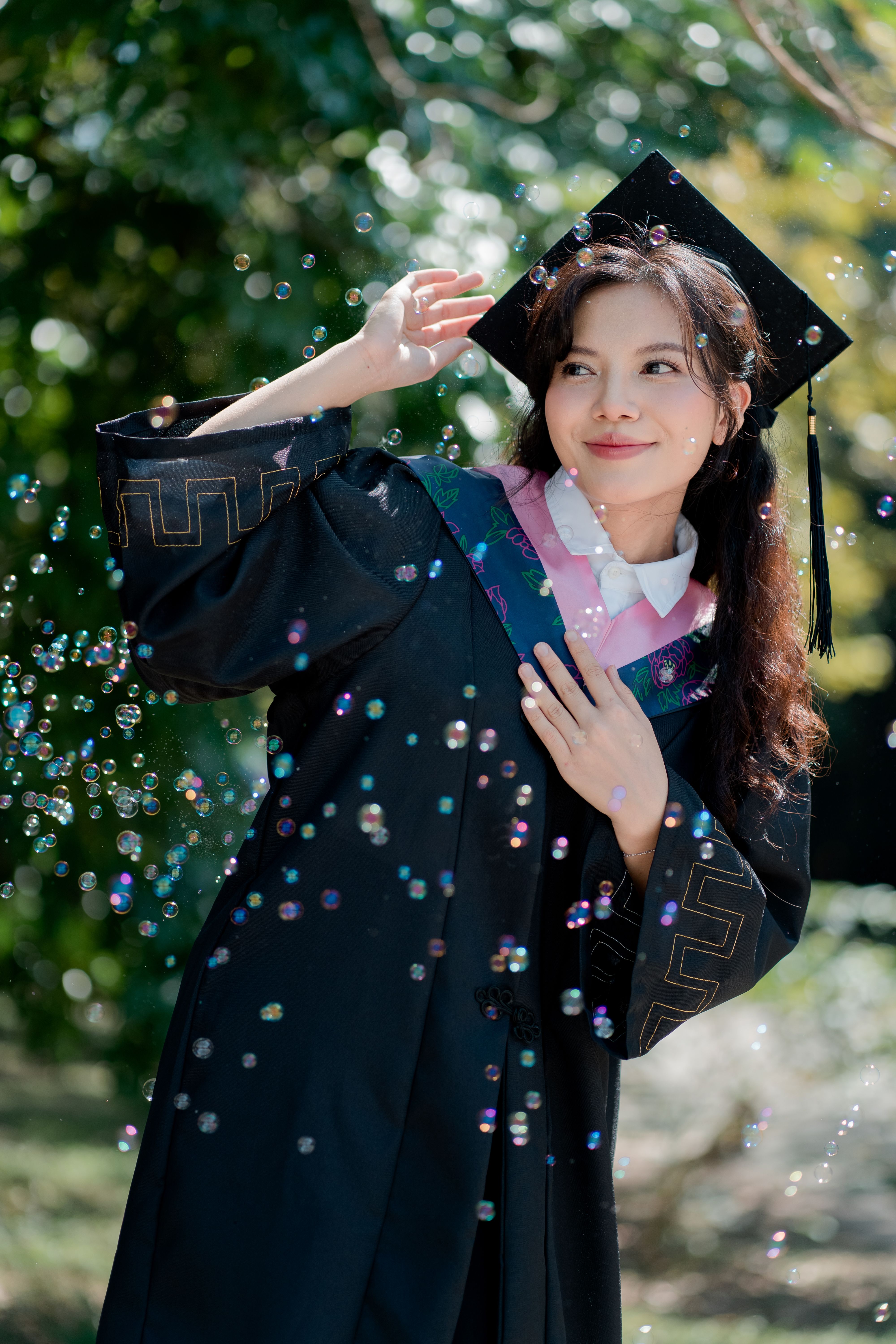 A Woman Wearing Black Backpack Carrying Books · Free Stock Photo