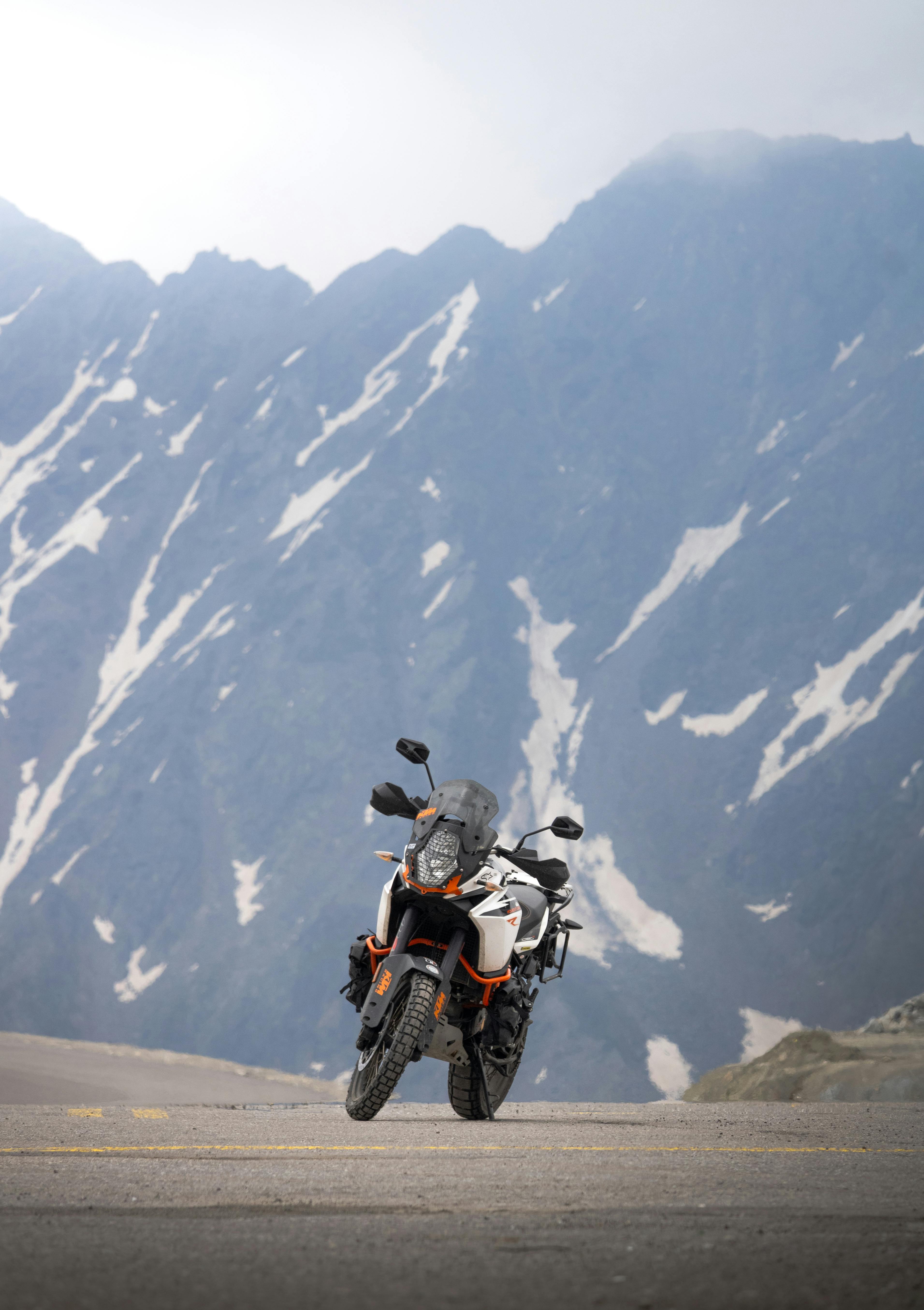 Adventure Motorcycle on Alpine Mountain Road · Free Stock Photo