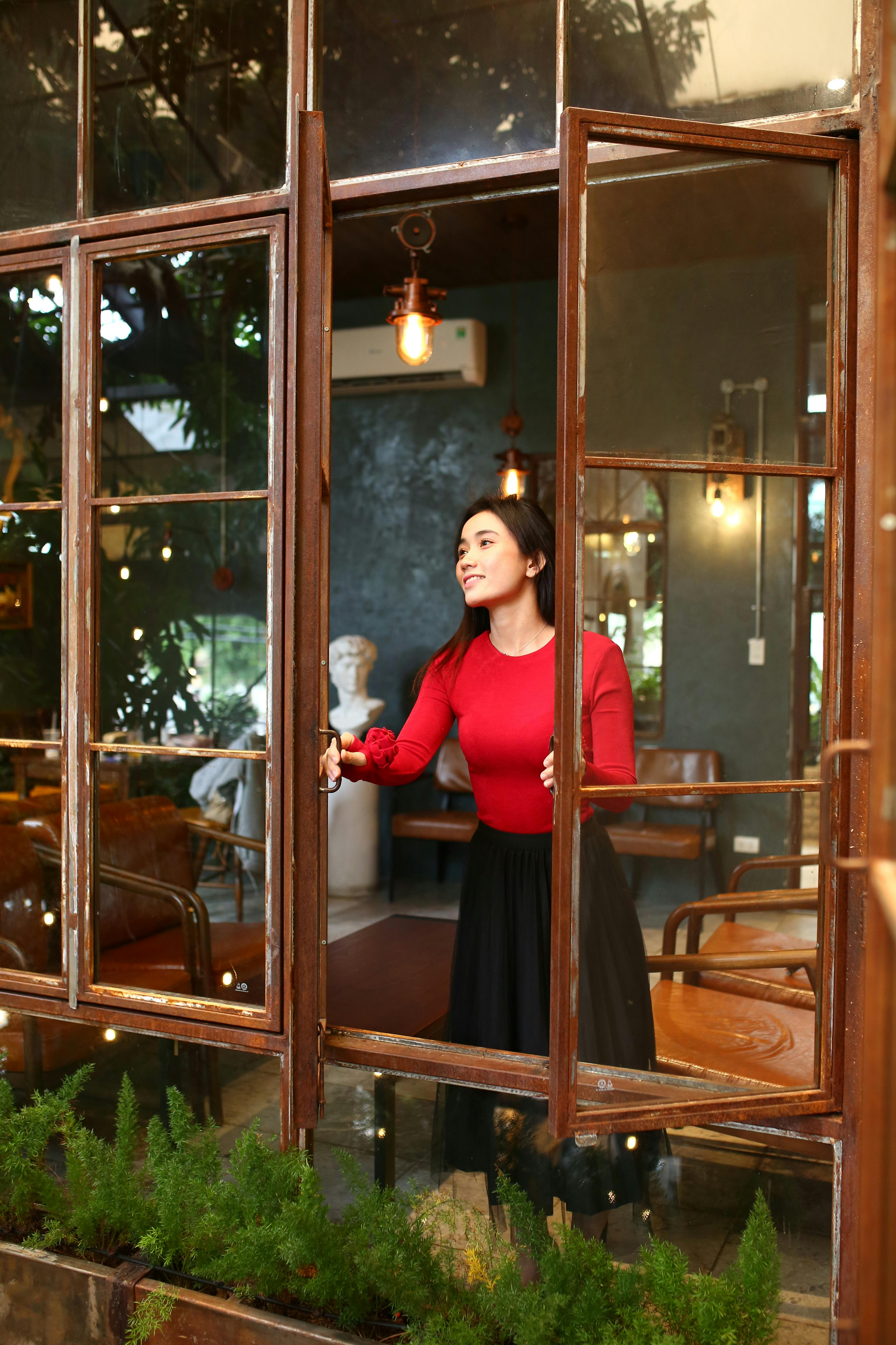 Portrait of Woman at Open Window in Hội An · Free Stock Photo