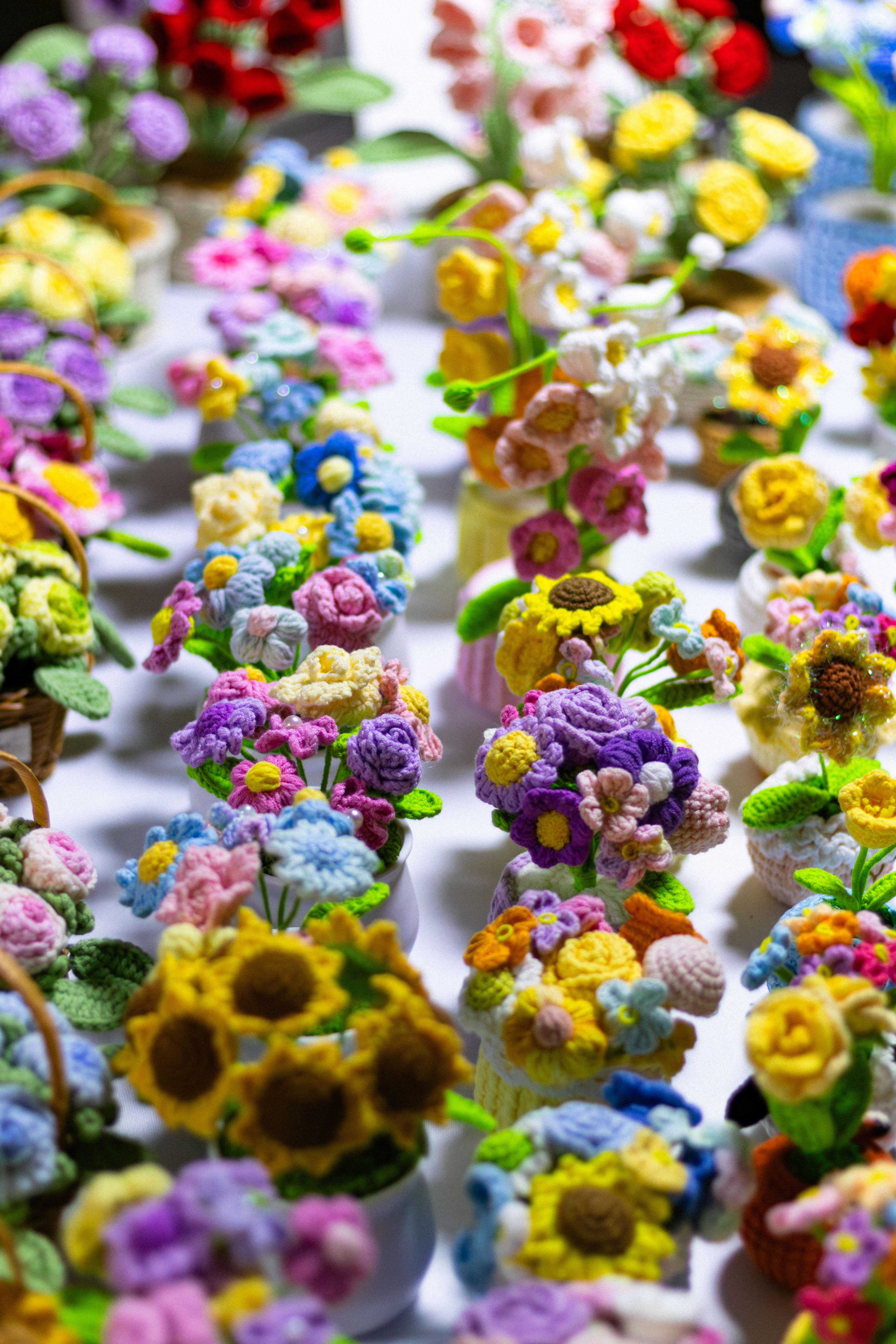 Vibrant Crochet Floral Arrangements Display · Free Stock Photo