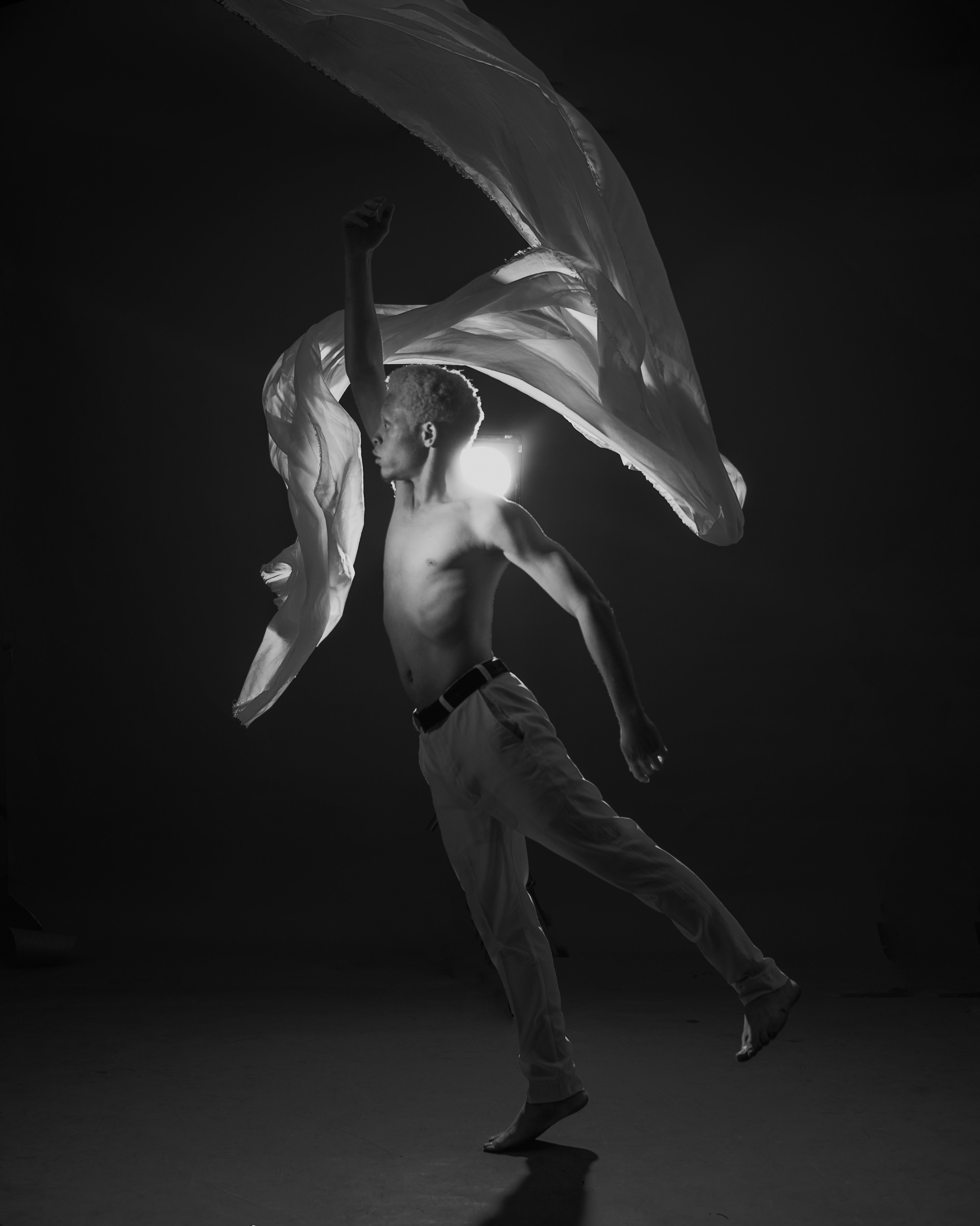 Dynamic Dance Pose with Flowing Fabric · Free Stock Photo