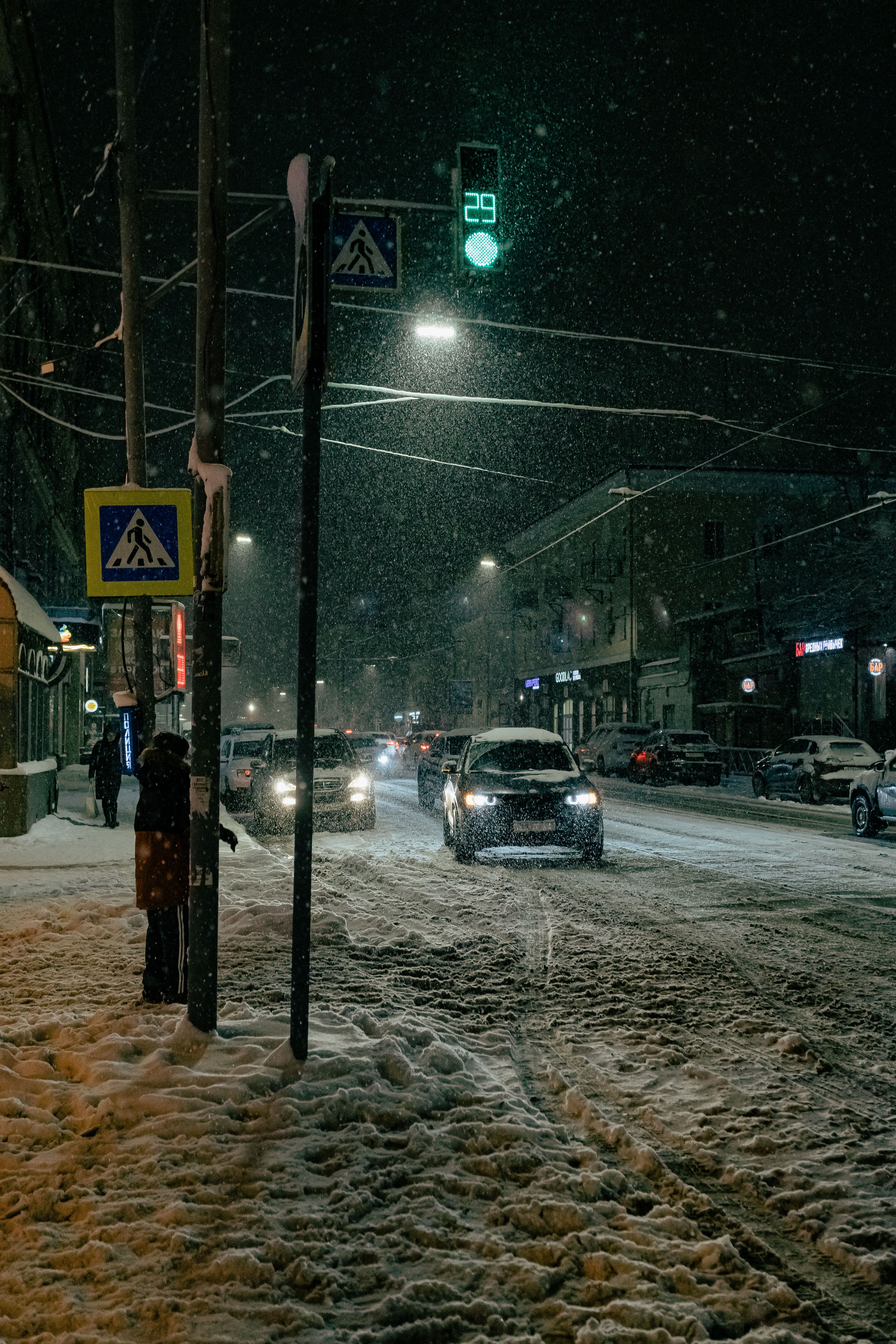 Winter Night Urban Street Scene with Snowfall · Free Stock Photo