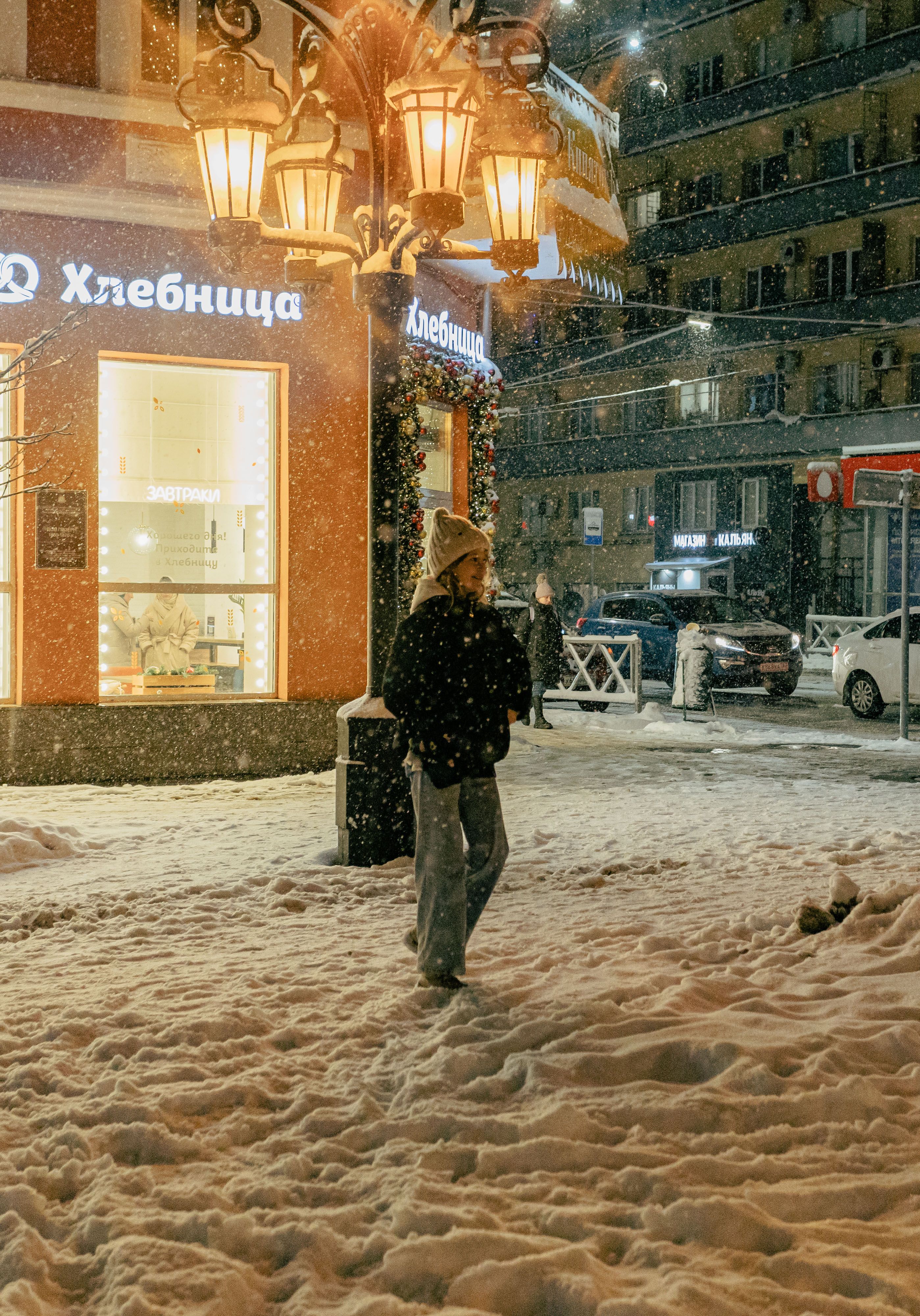 Winter Night in a Snowy Urban Cityscape · Free Stock Photo