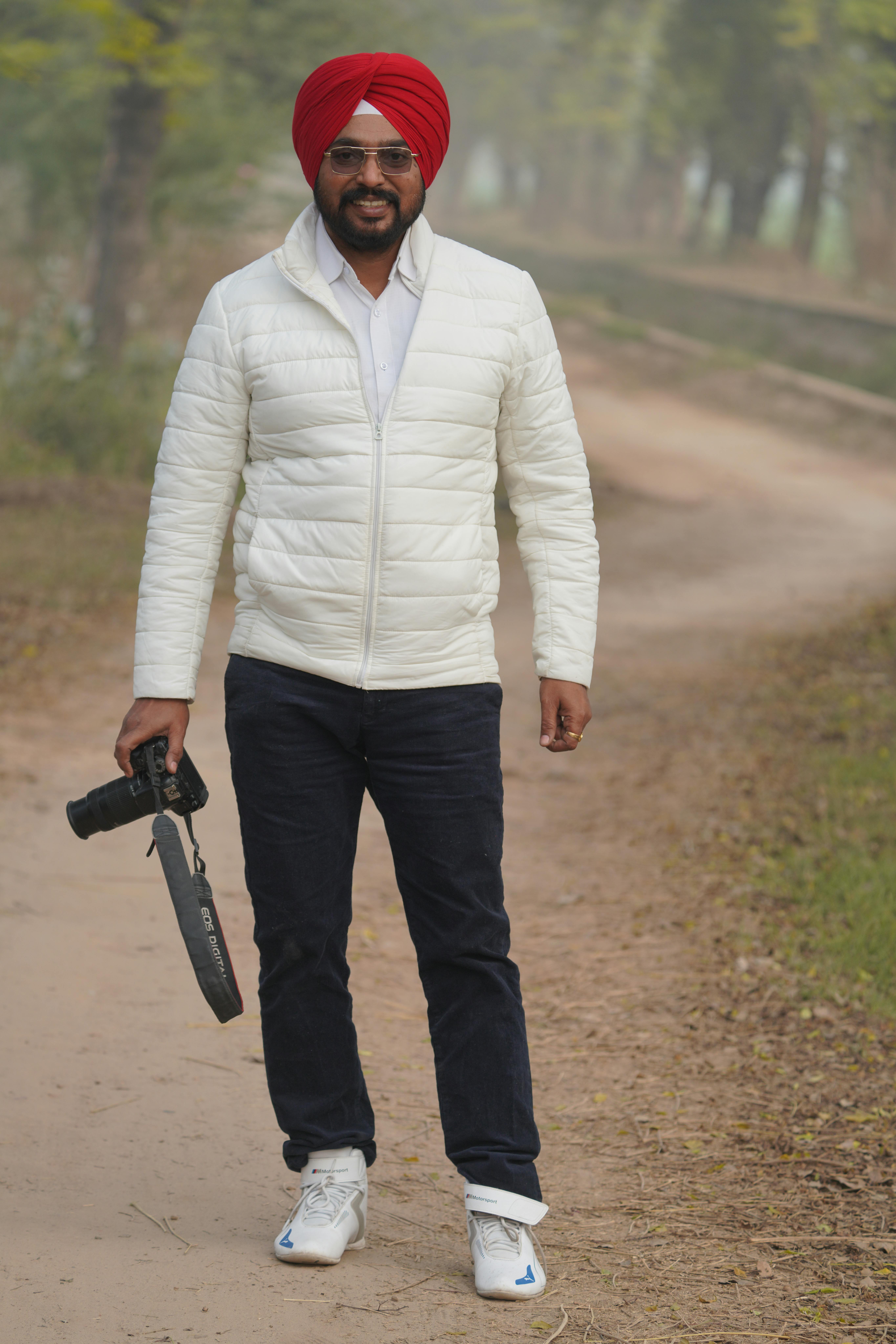 Photographer with Camera on Rural Pathway · Free Stock Photo