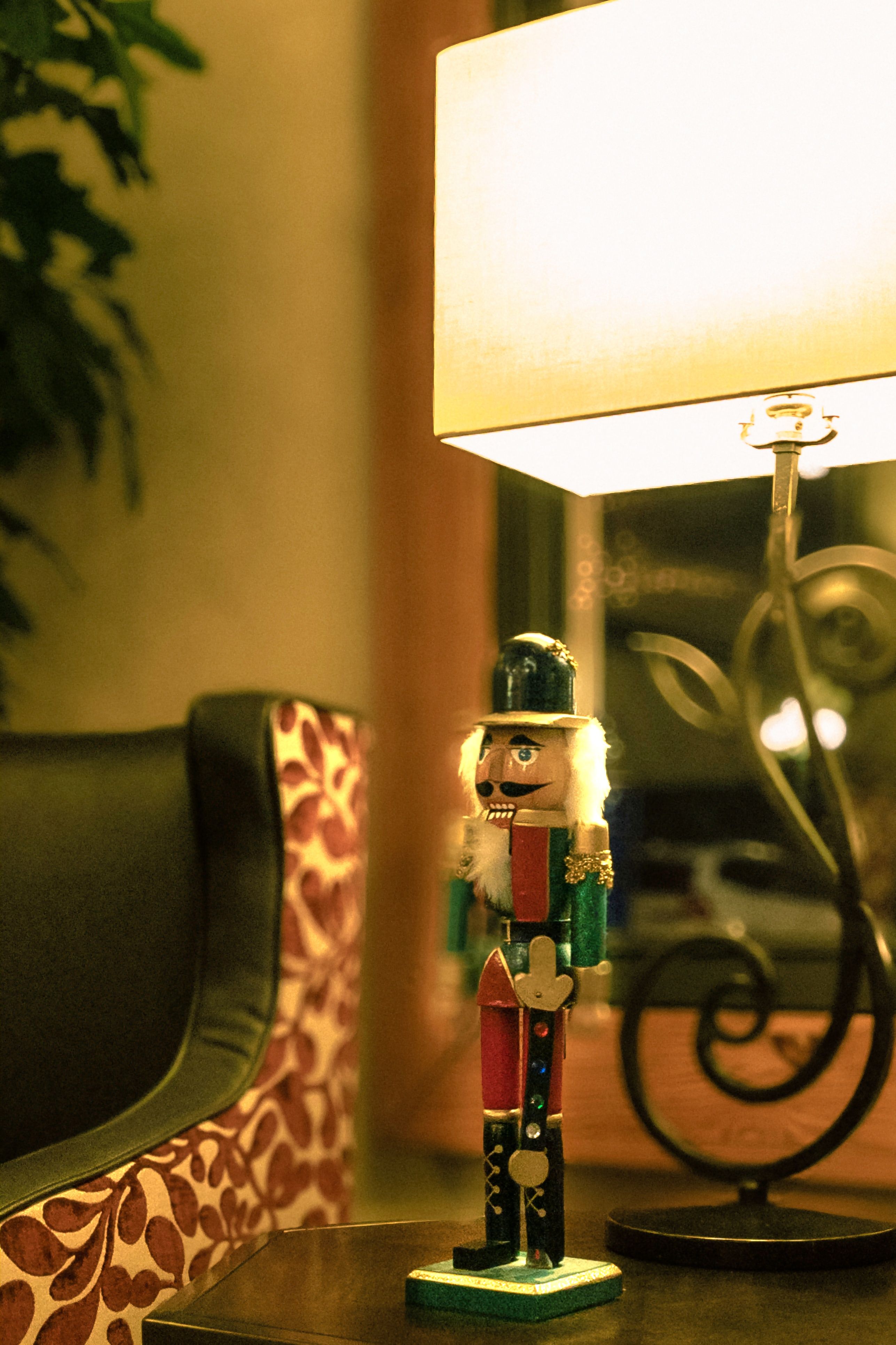 Cozy Room with Nutcracker and Ambient Lamp · Free Stock Photo