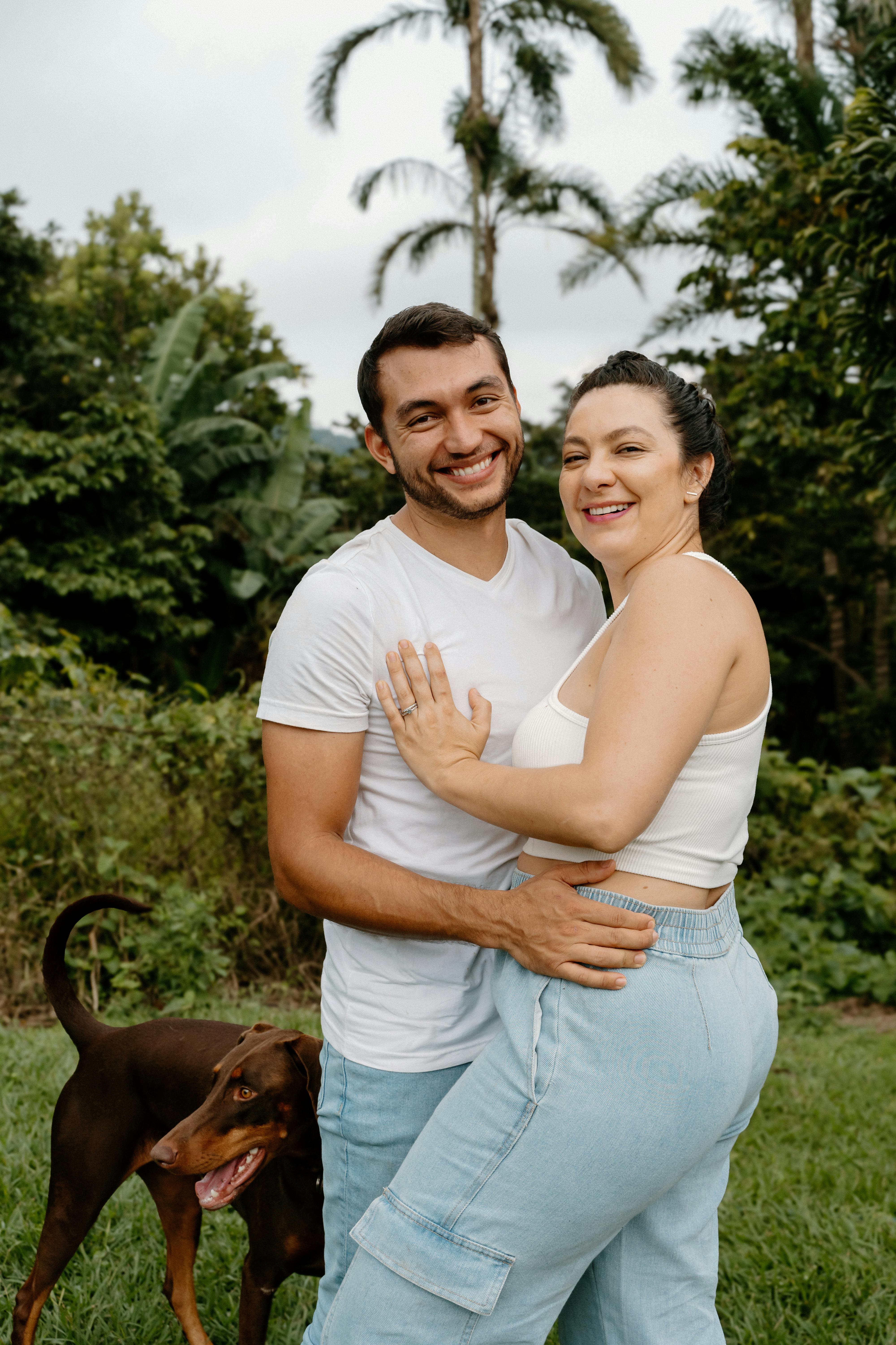 Happy Couple with Dog in Costa Rican Jungle · Free Stock Photo