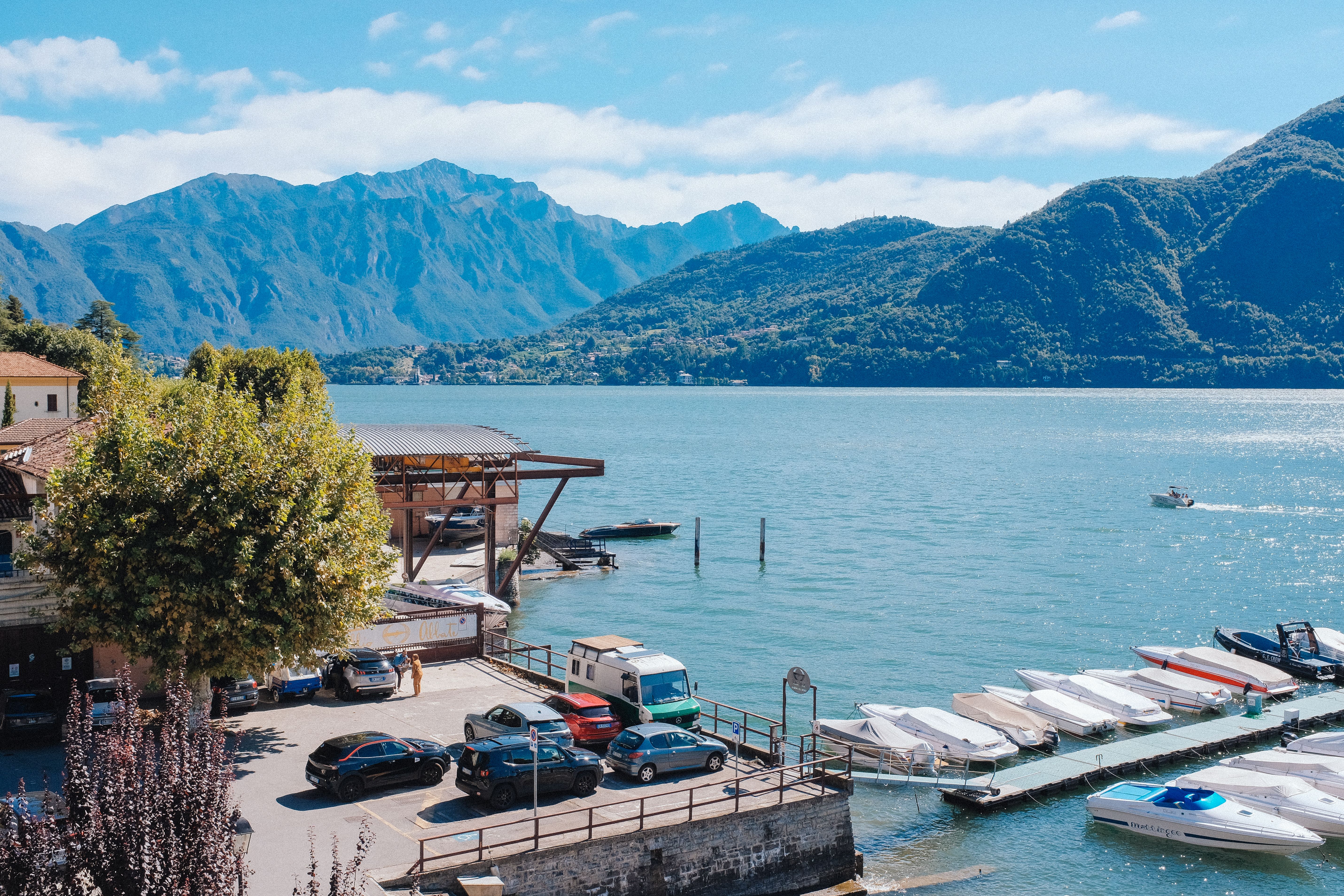 Scenic Lakefront Harbor with Mountain Views · Free Stock Photo