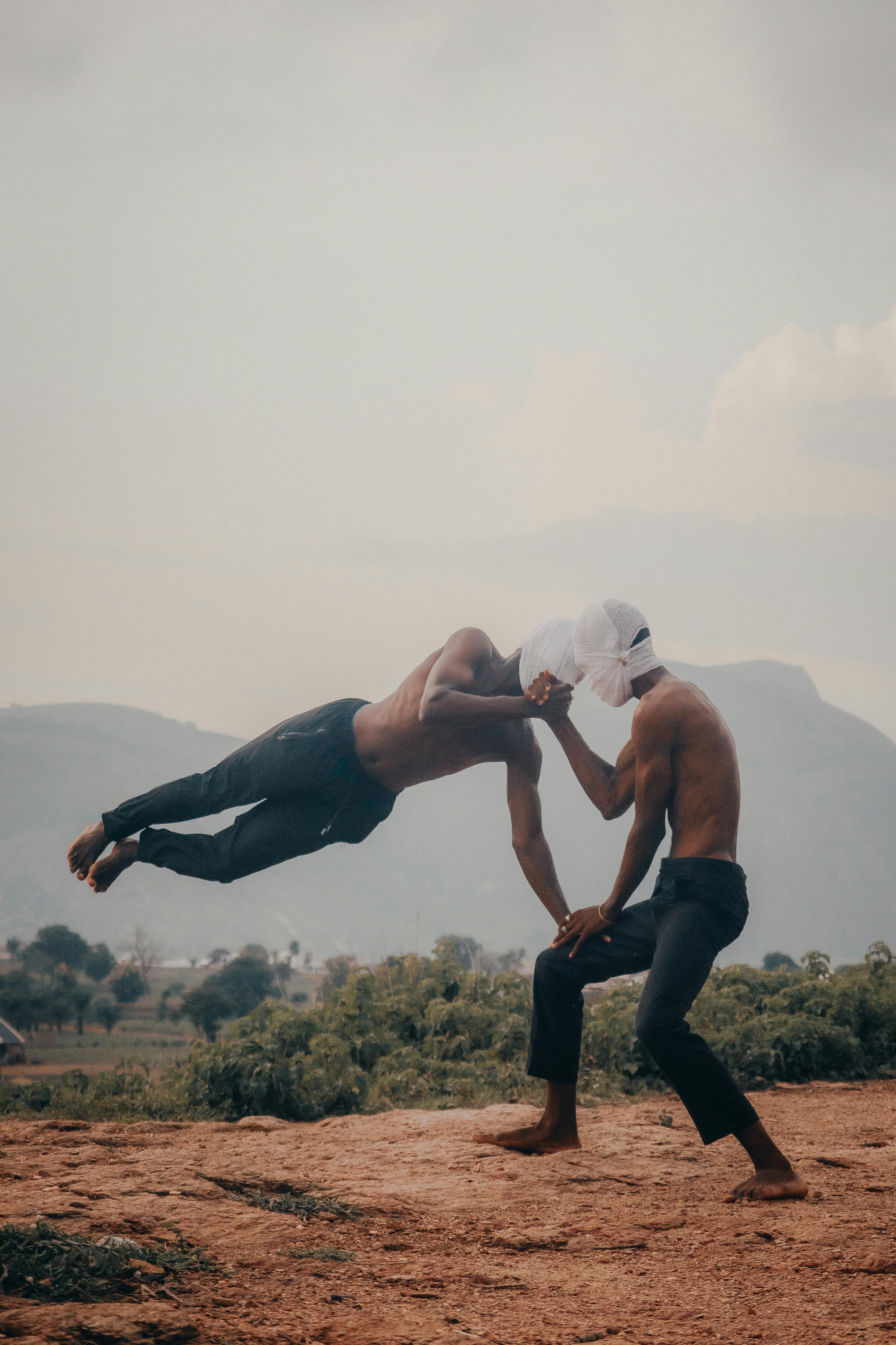 Athletic Stunt Performance in Rural Landscape · Free Stock Photo