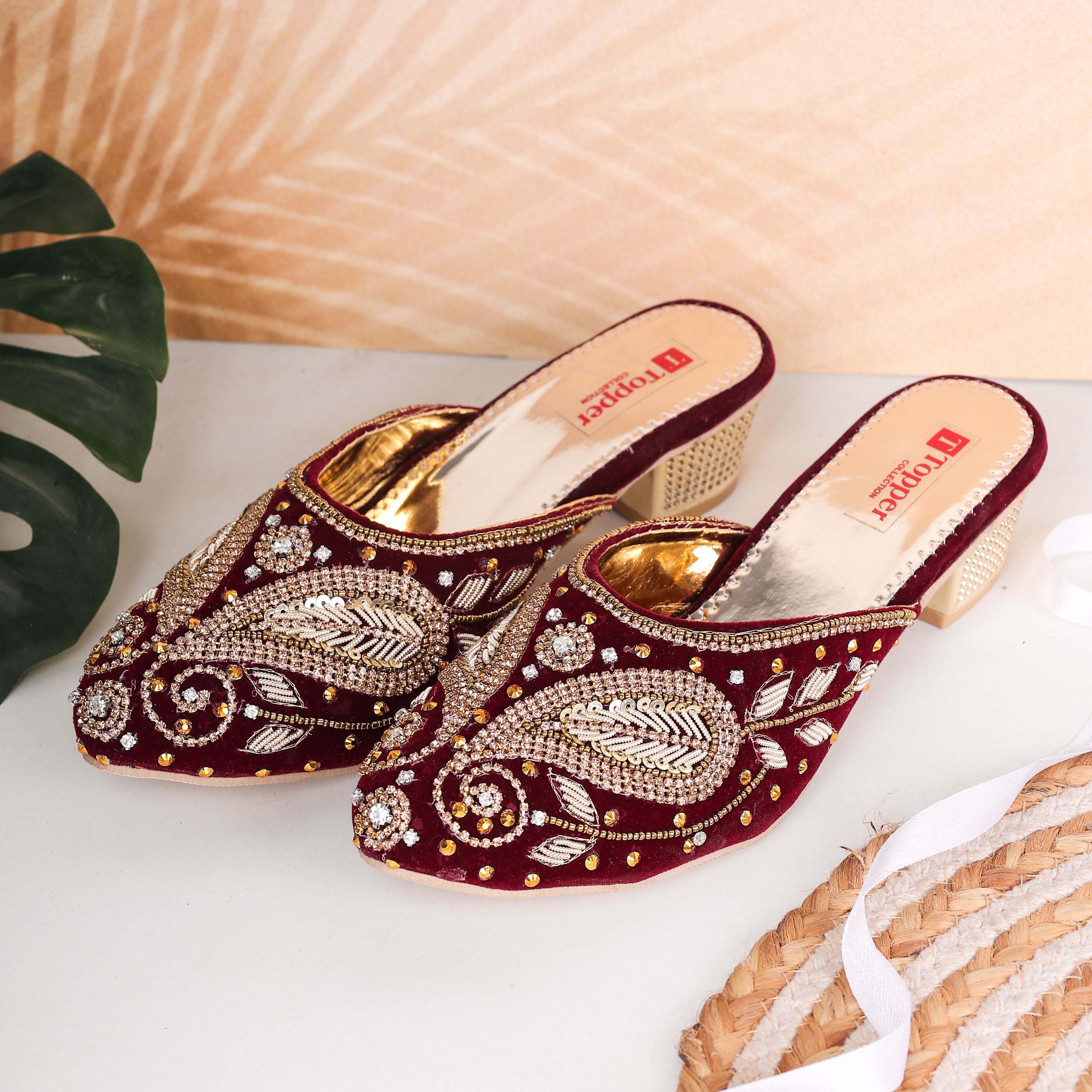 Embellished Burgundy Jutti Shoes on Display · Free Stock Photo