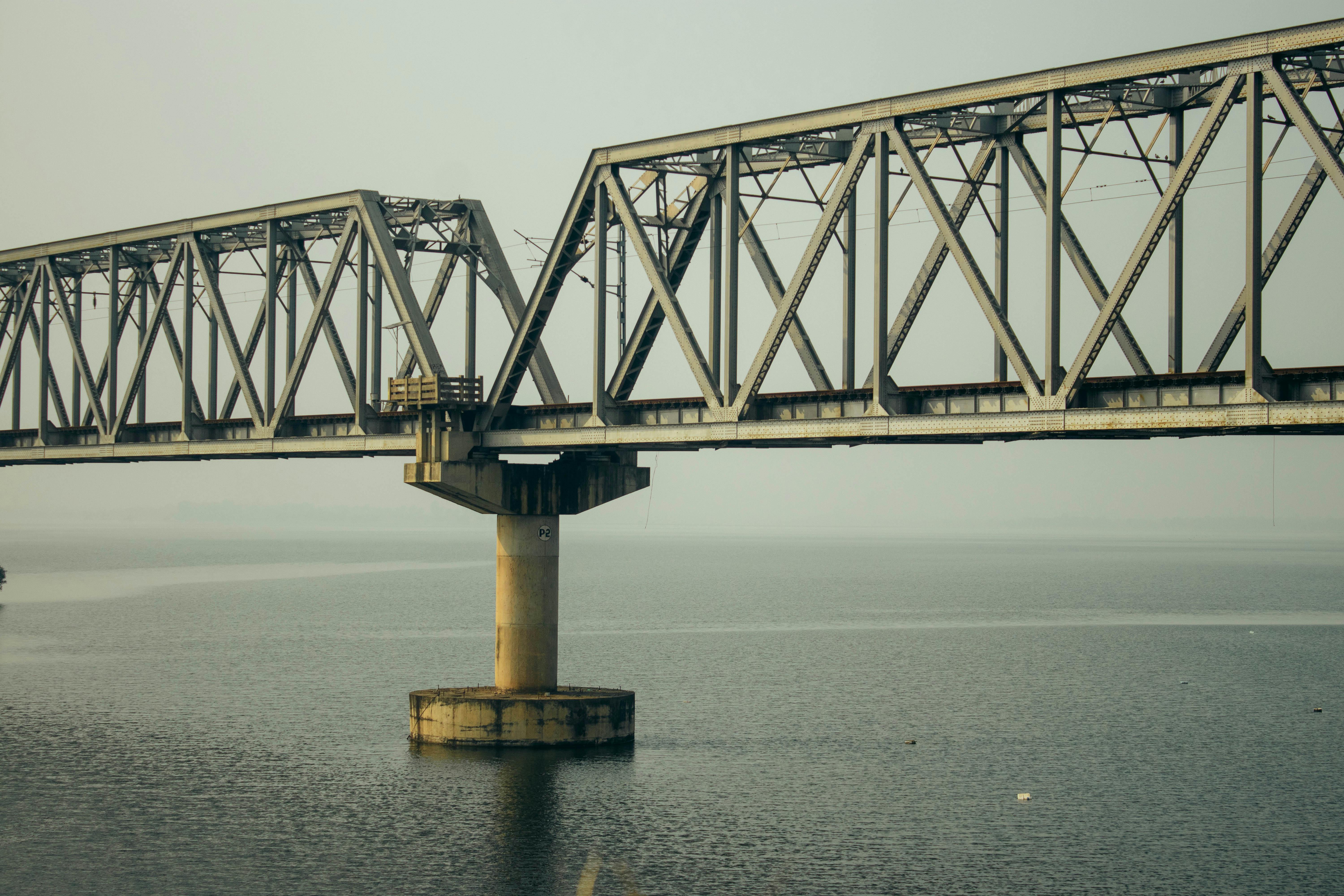 Steel Bridge over Calm Water · Free Stock Photo