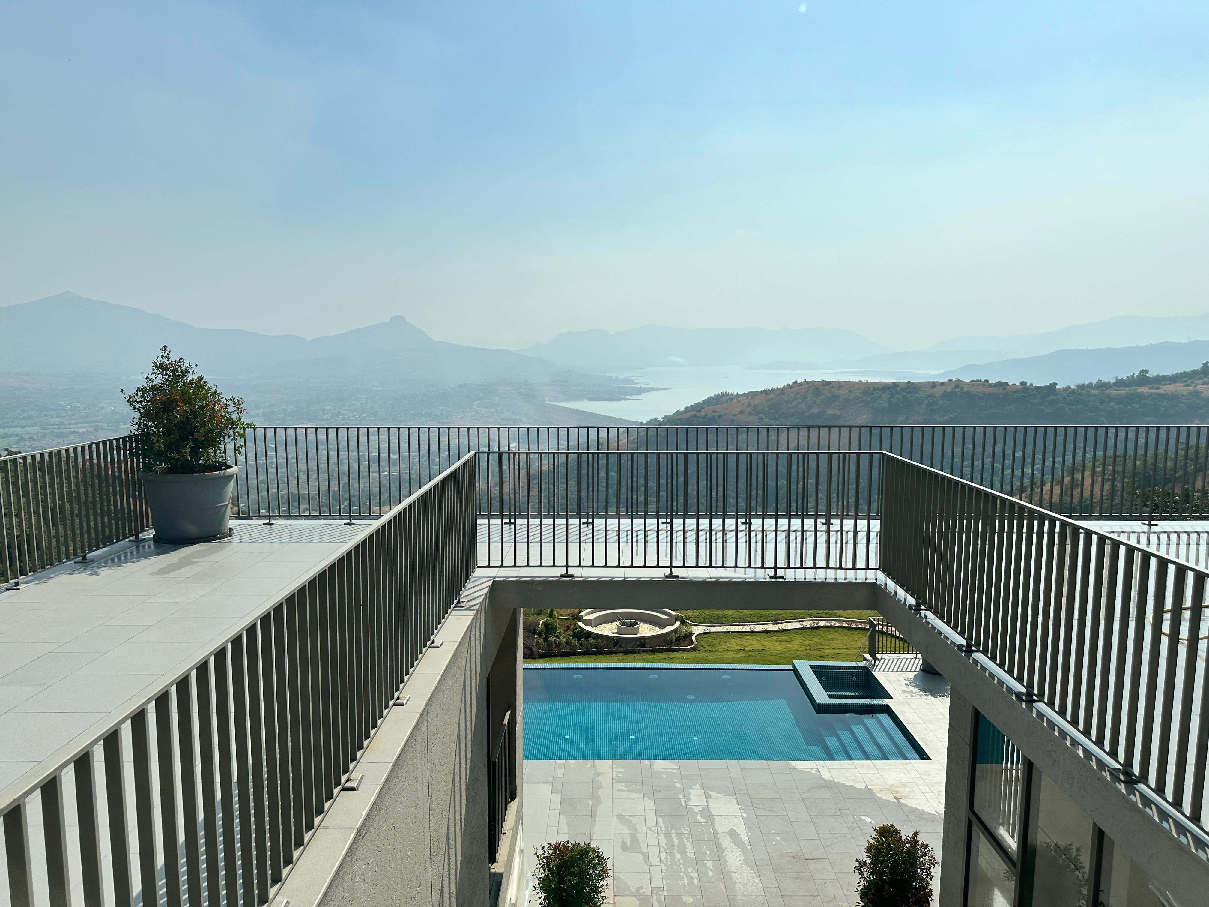 Scenic Poolside View Overlooking Lush Valley · Free Stock Photo