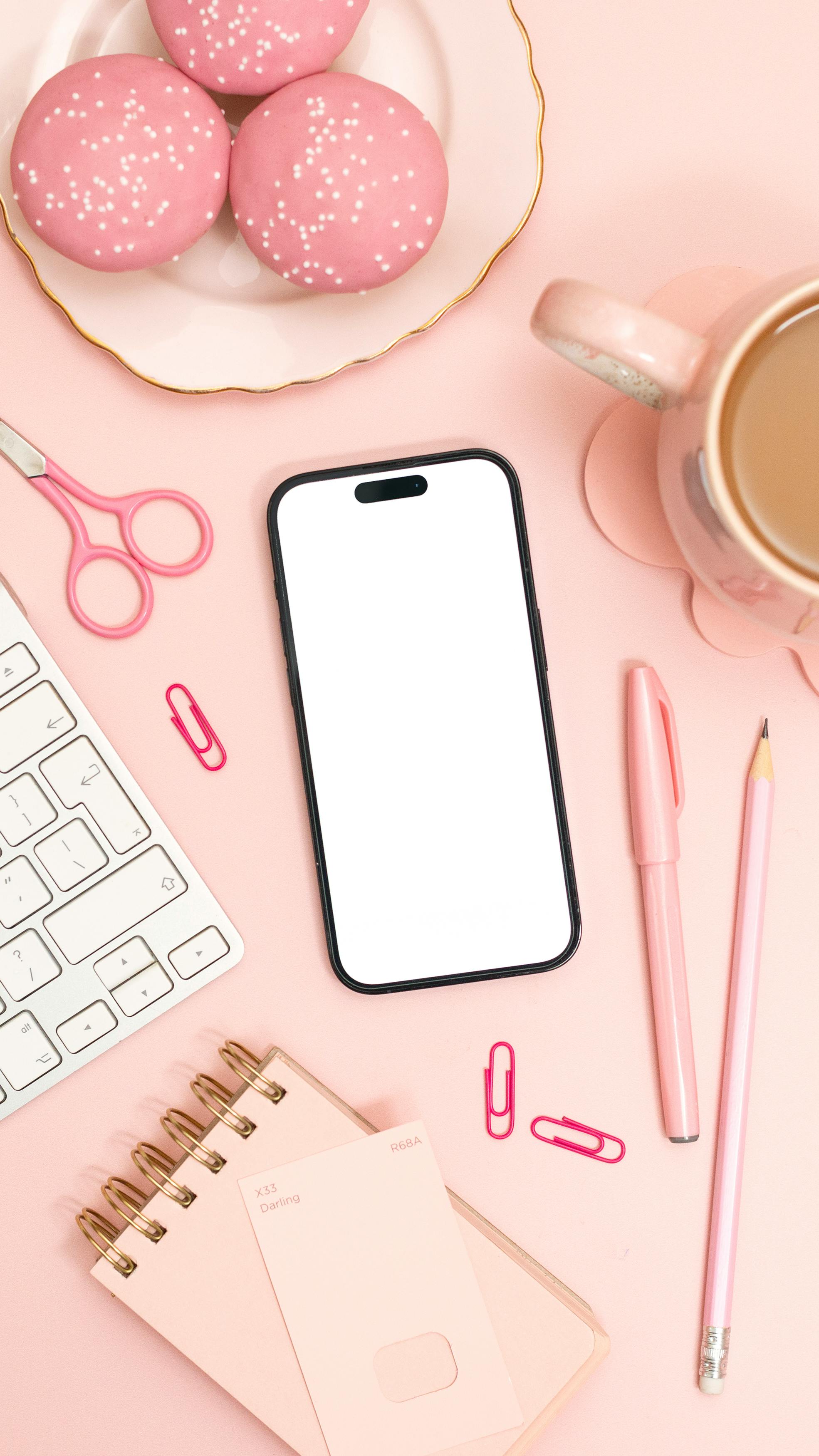 Pink Themed Office Desk with Smartphone Mockup · Free Stock Photo