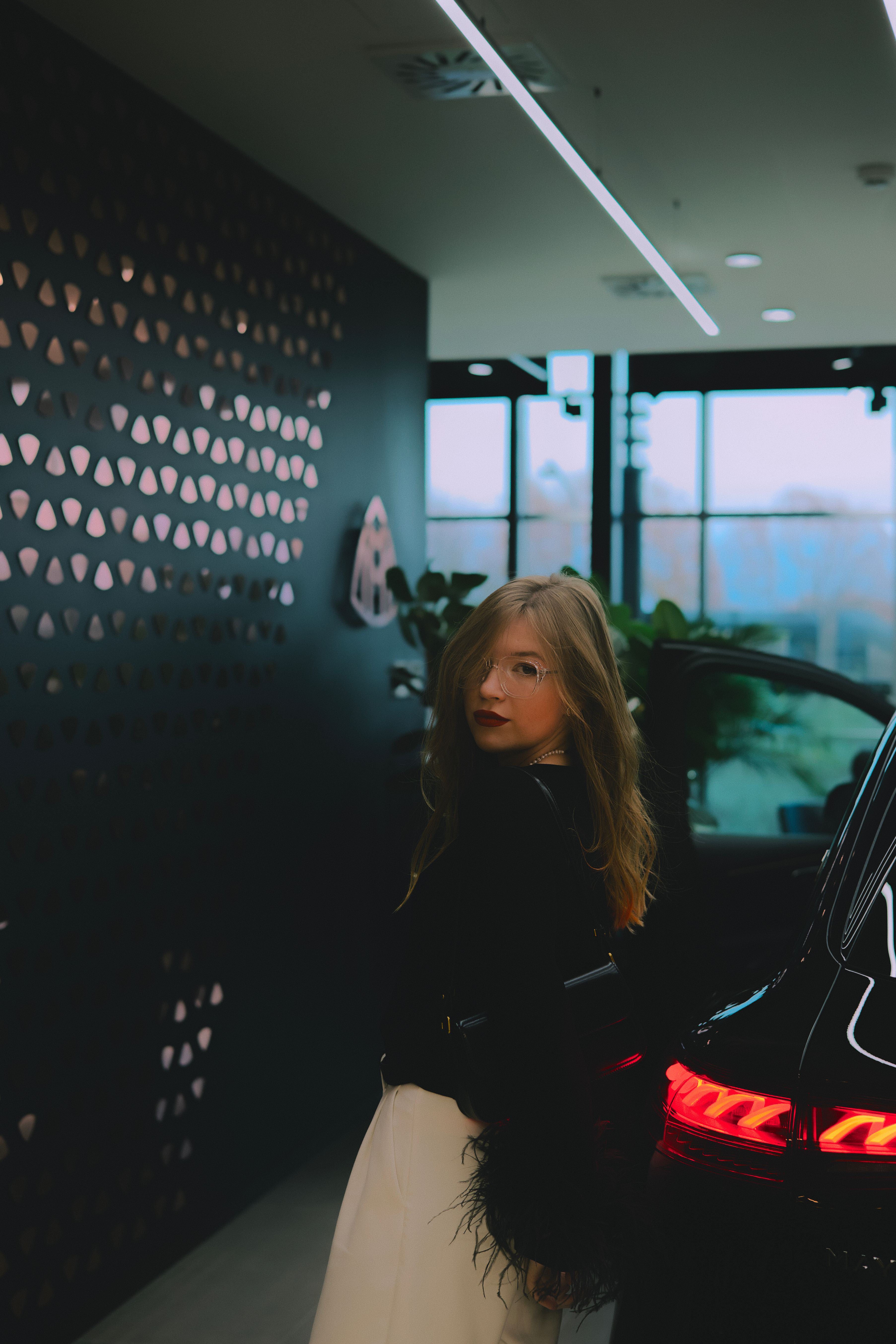 Chic Portrait in Modern Indoor Setting · Free Stock Photo