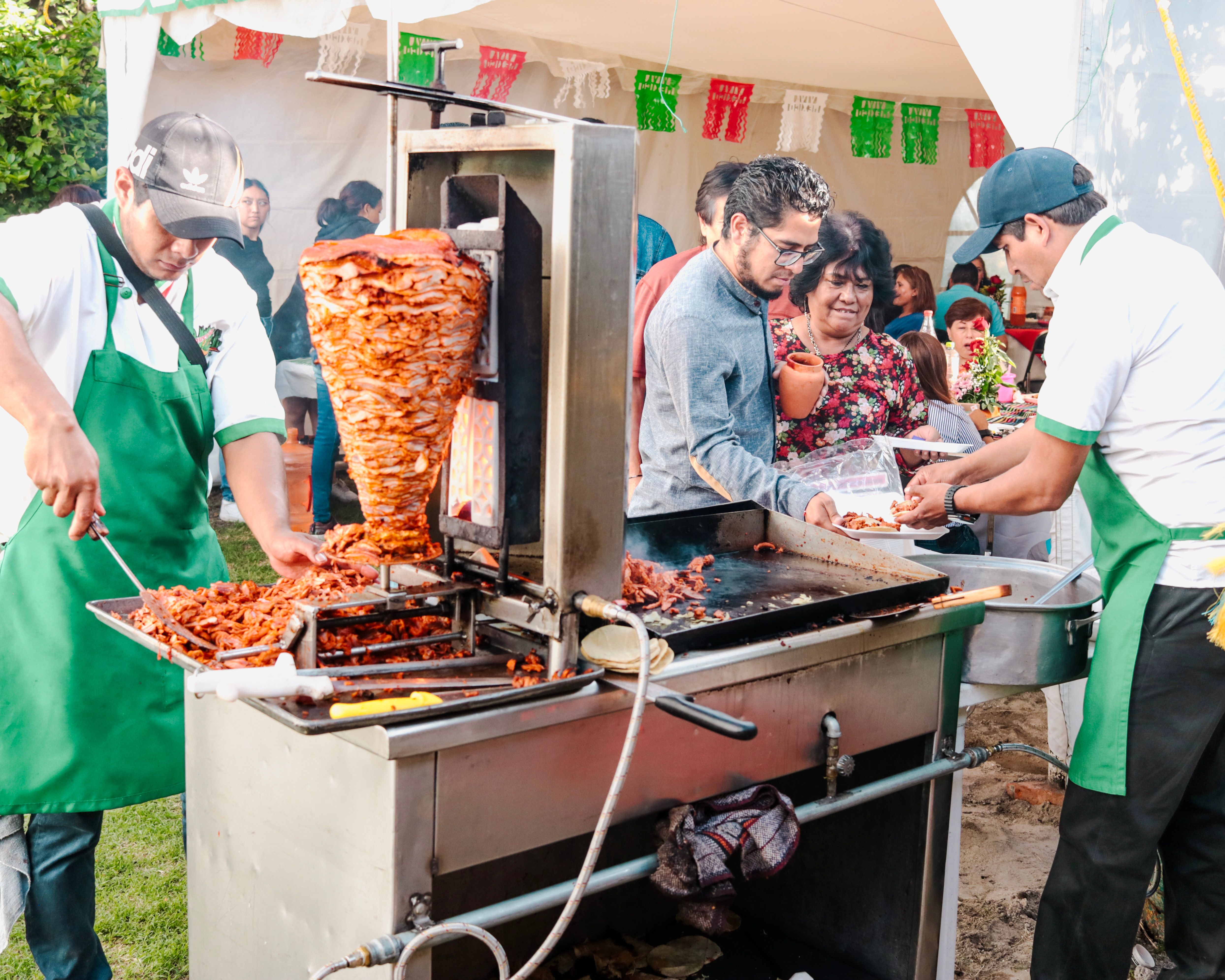Outdoor Mexican Street Food Event with Tacos Al Pastor · Free Stock Photo