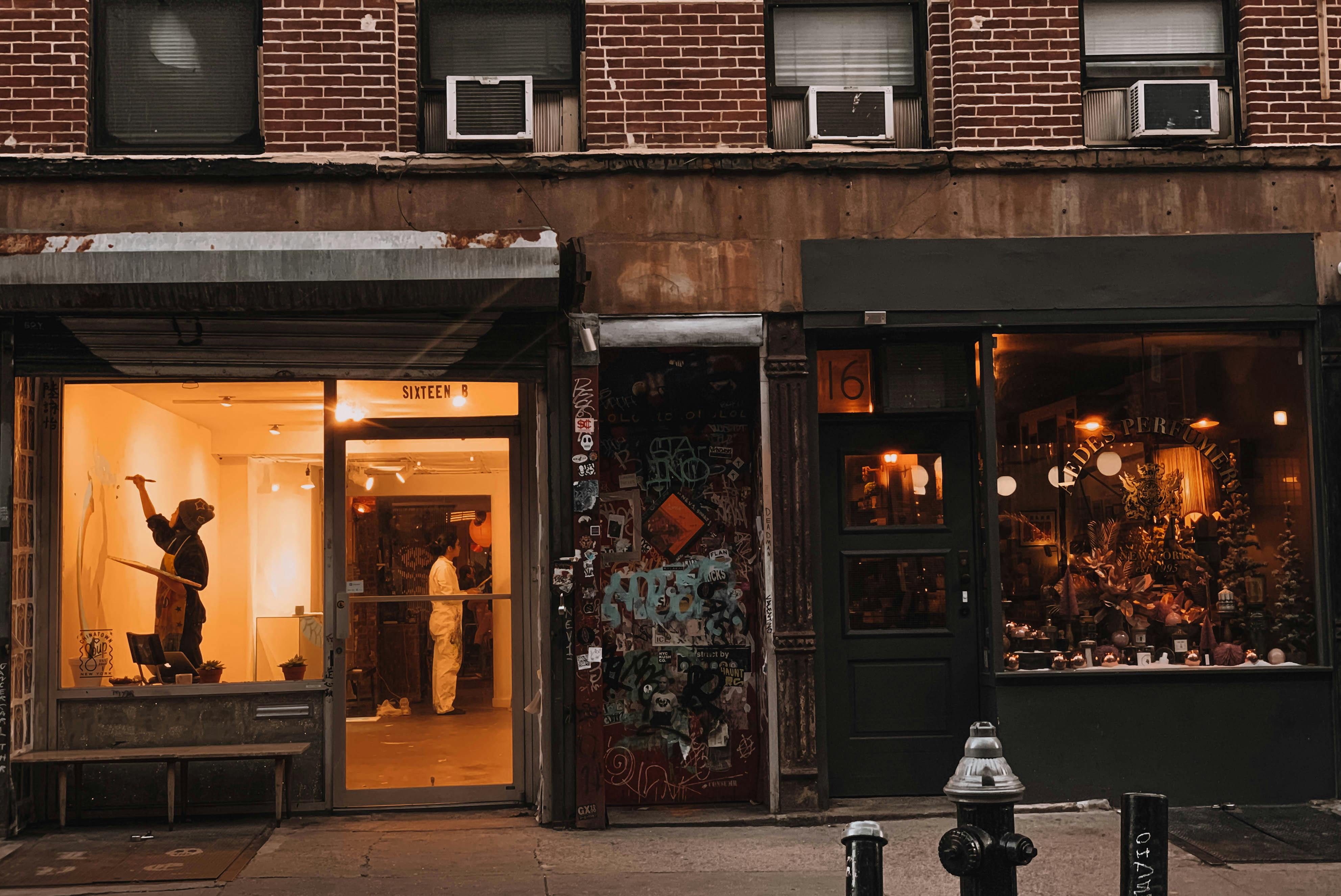 Urban Storefront with Art and Florist Display · Free Stock Photo
