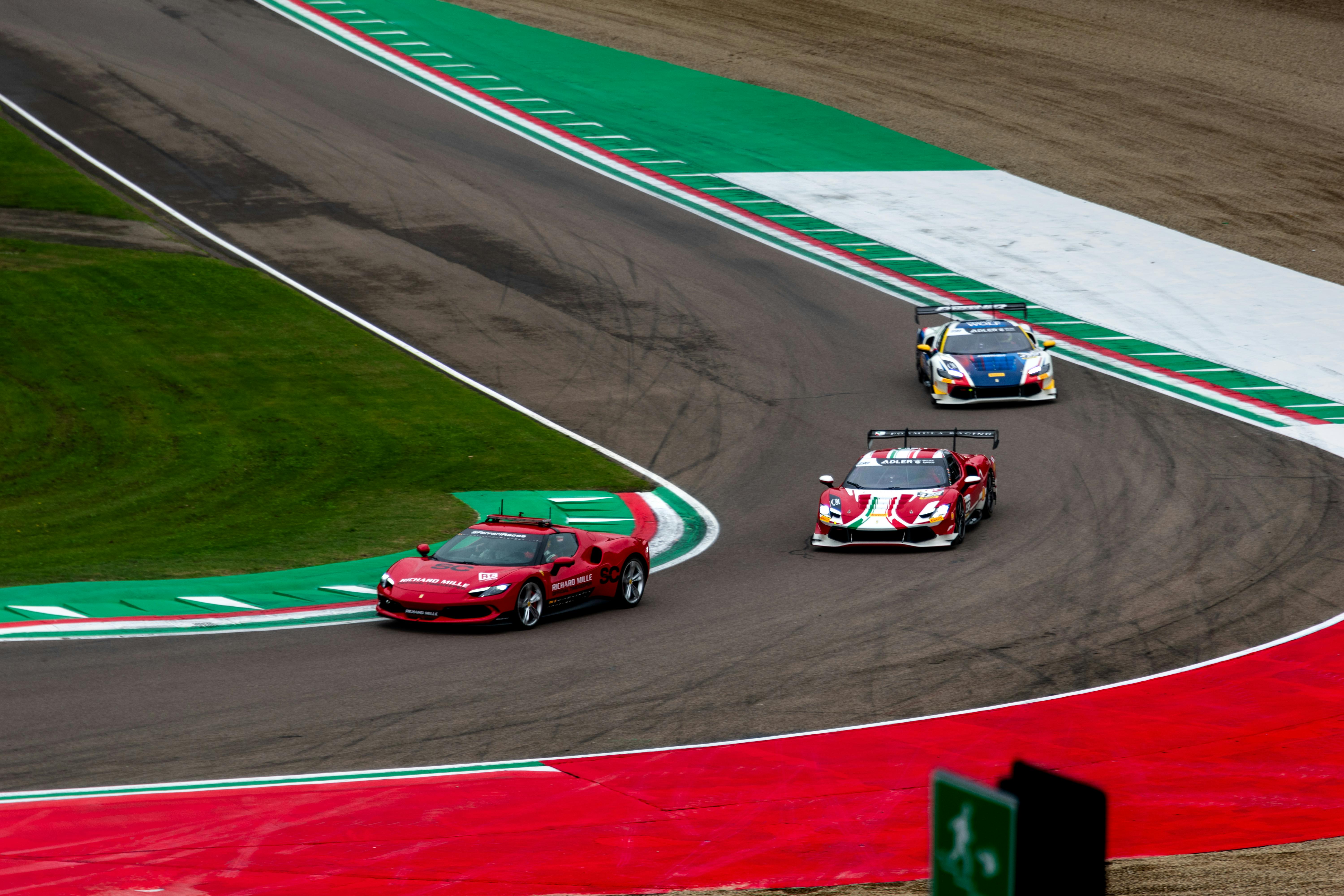 High-speed Race Cars on Professional Track · Free Stock Photo