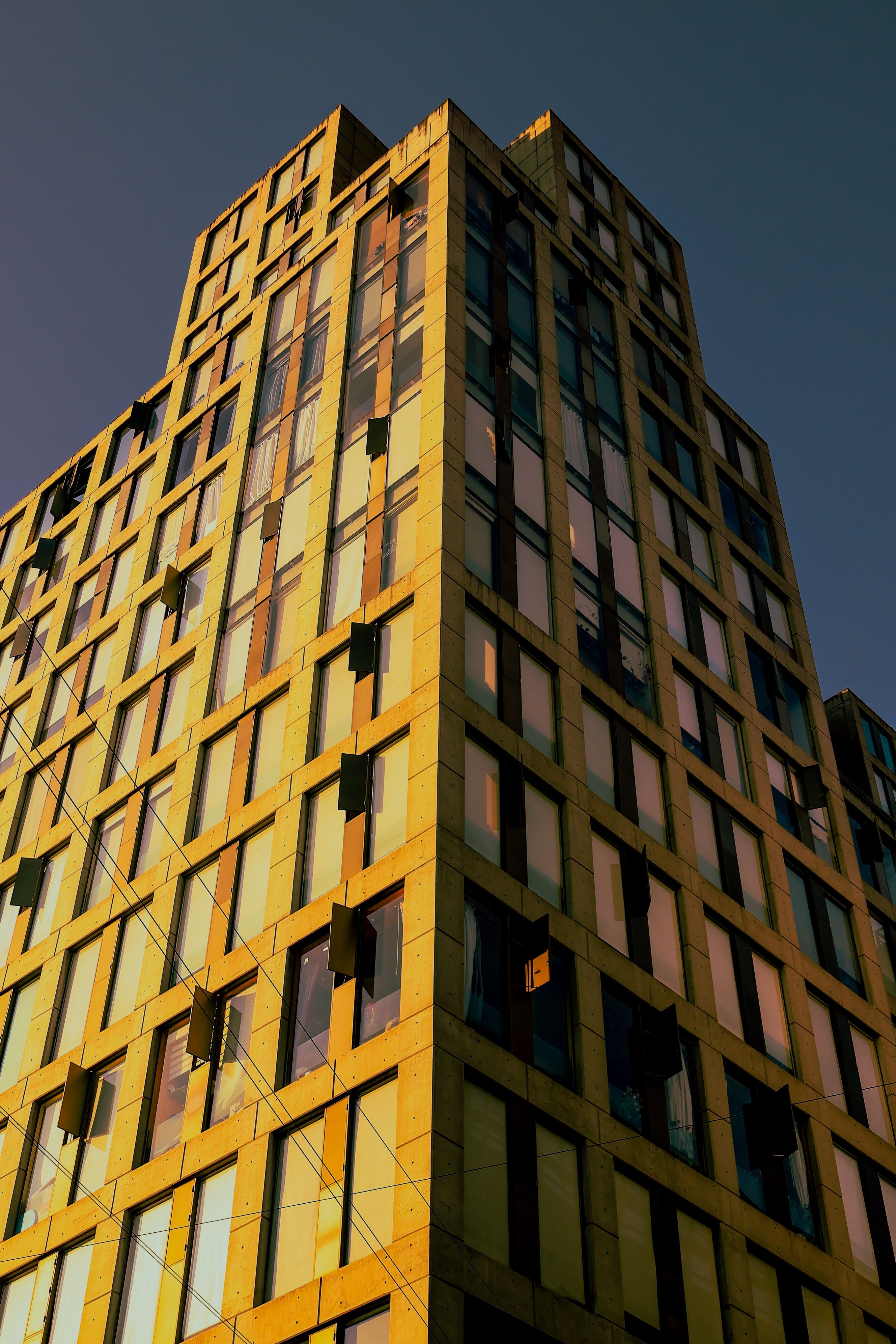 Modern Urban High-Rise Building at Sunset · Free Stock Photo