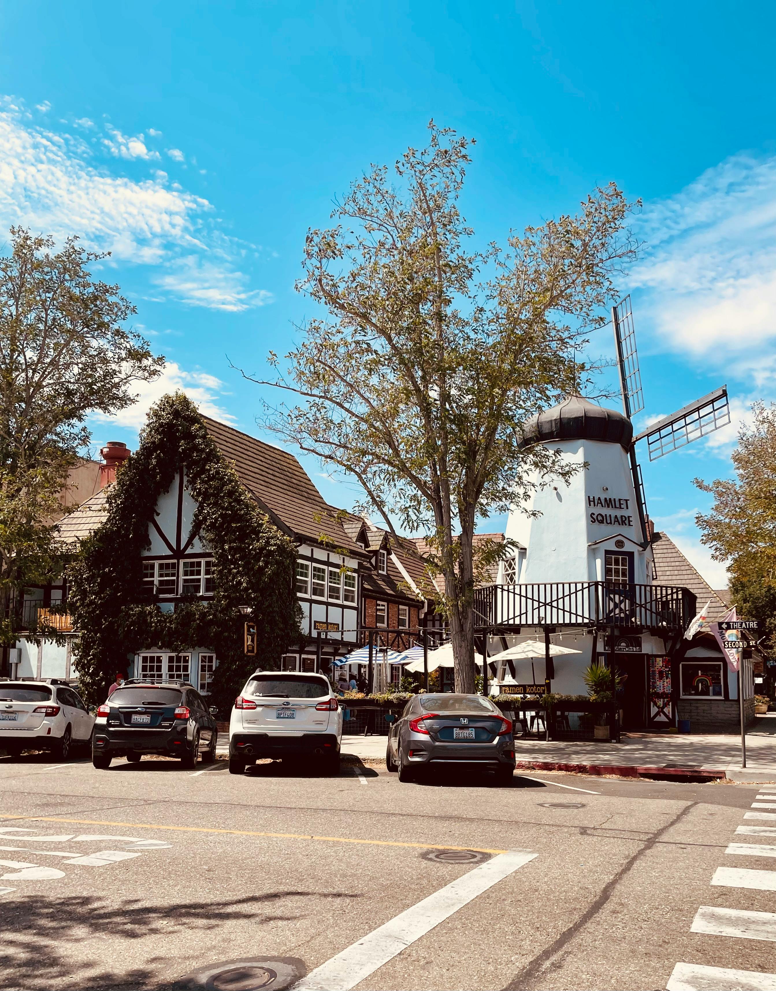 Charming European Style Village with Windmill · Free Stock Photo