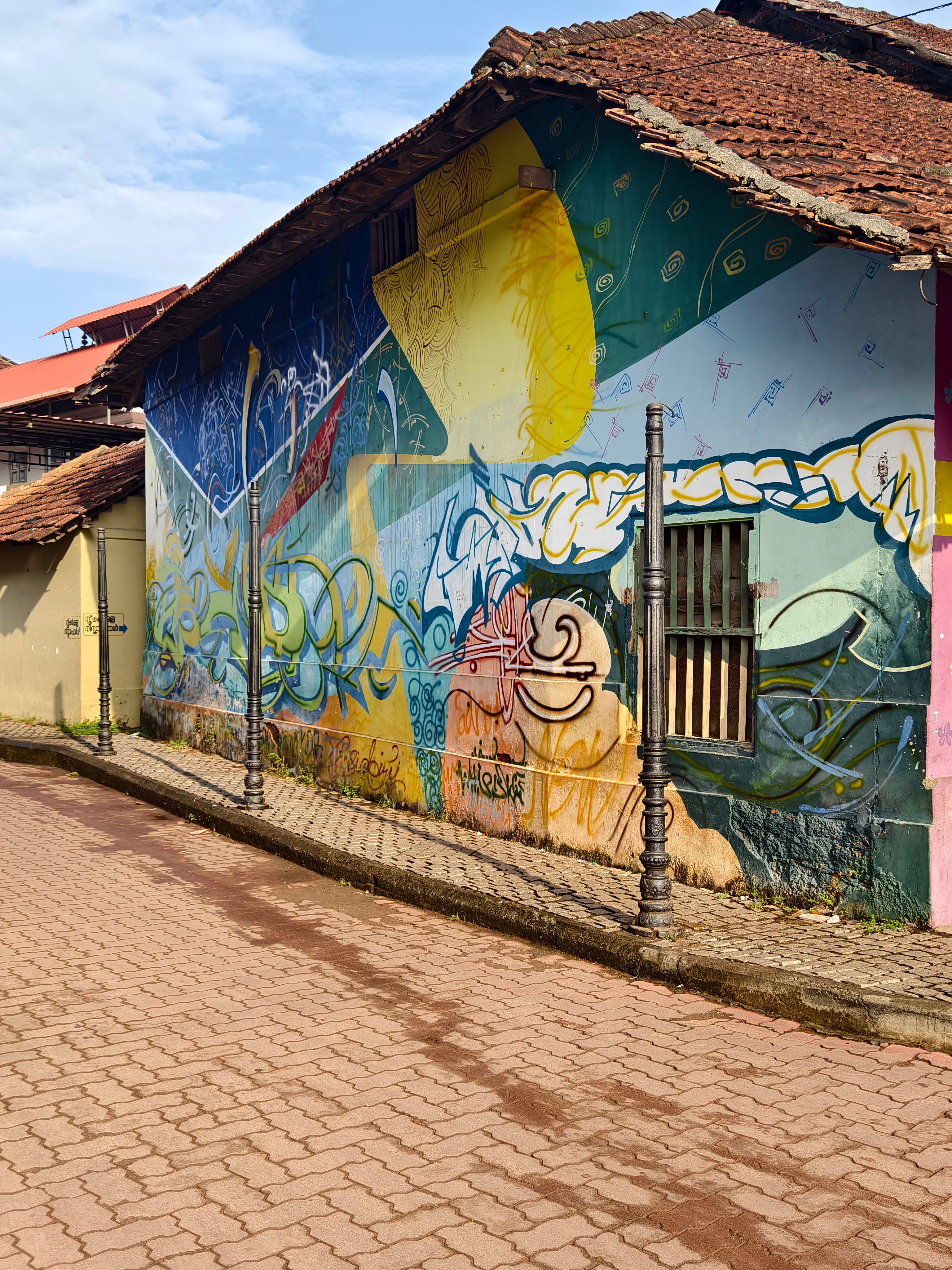 Colorful Street Art on Rustic Wall in Urban Area · Free Stock Photo