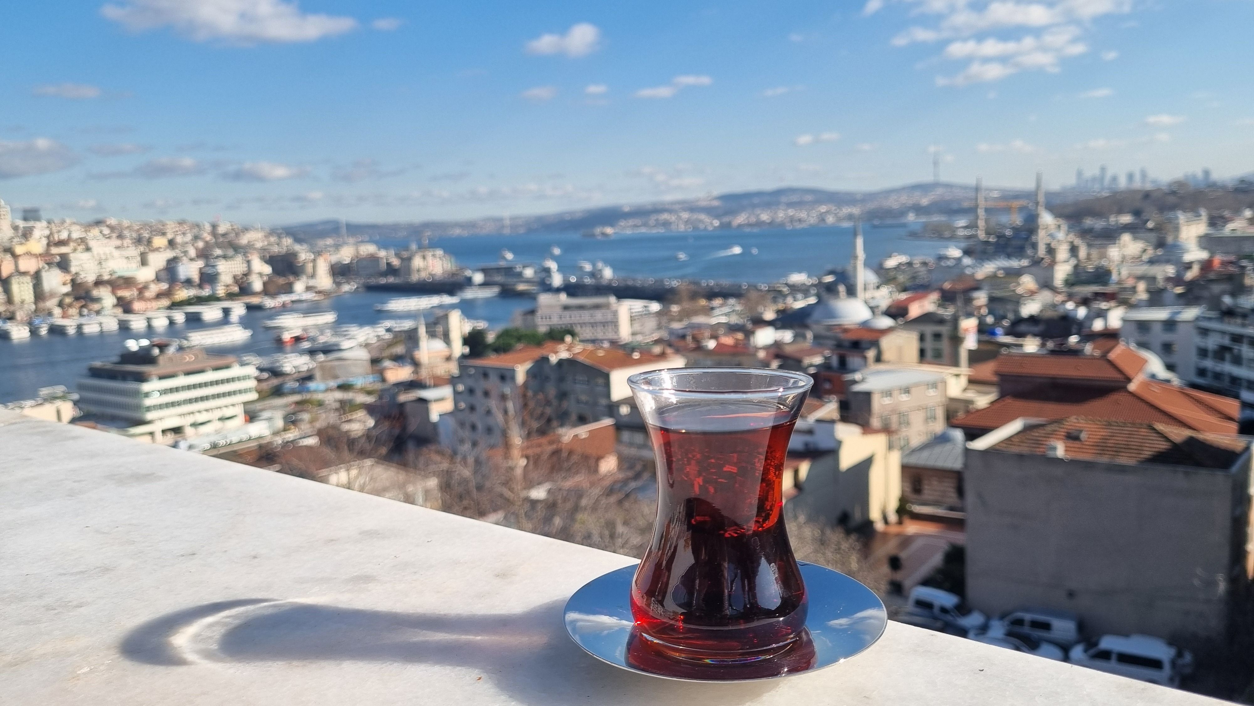 Tea Glass Overlooking Scenic Istanbul Panorama · Free Stock Photo