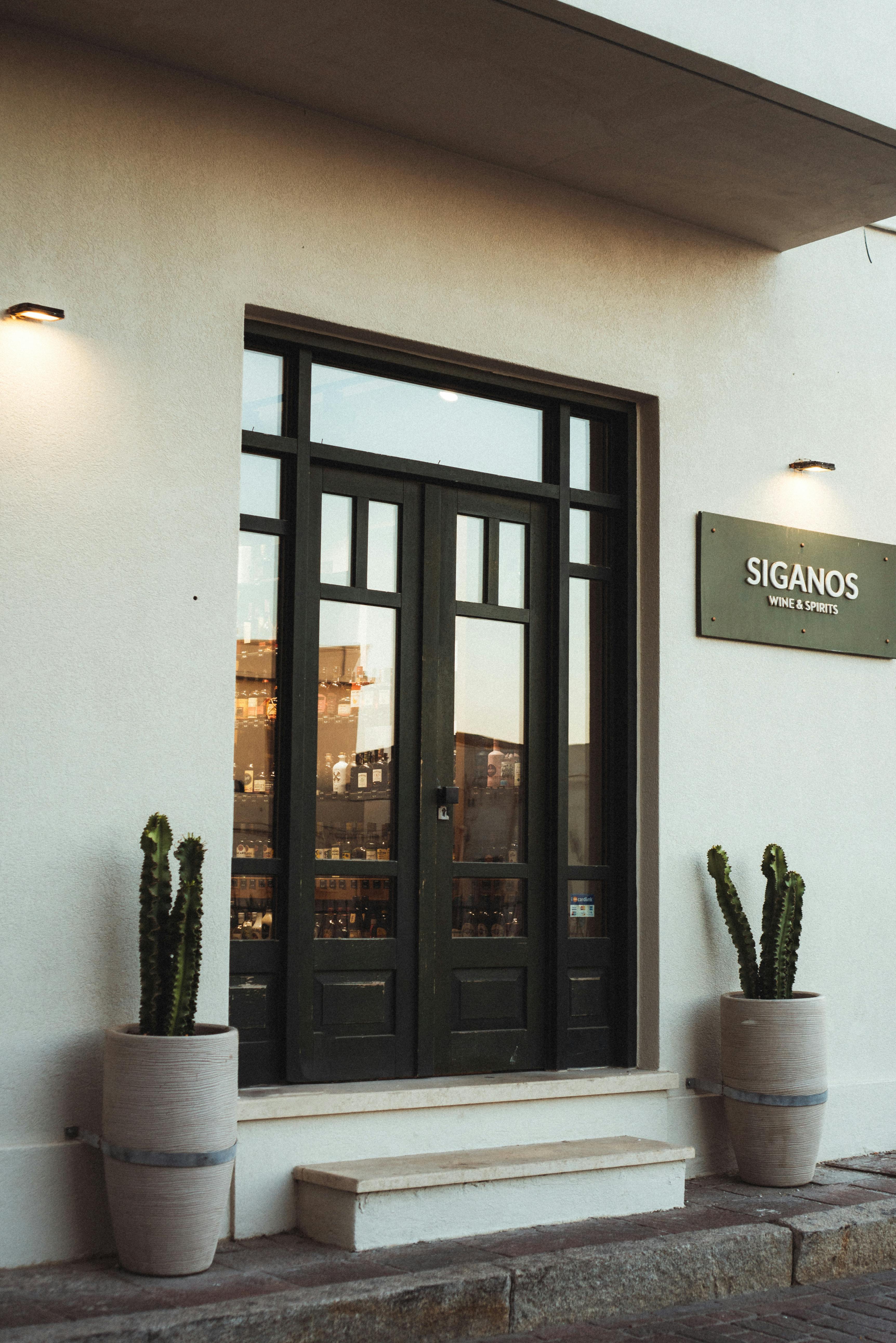 Elegant Wine & Spirits Storefront Exterior · Free Stock Photo