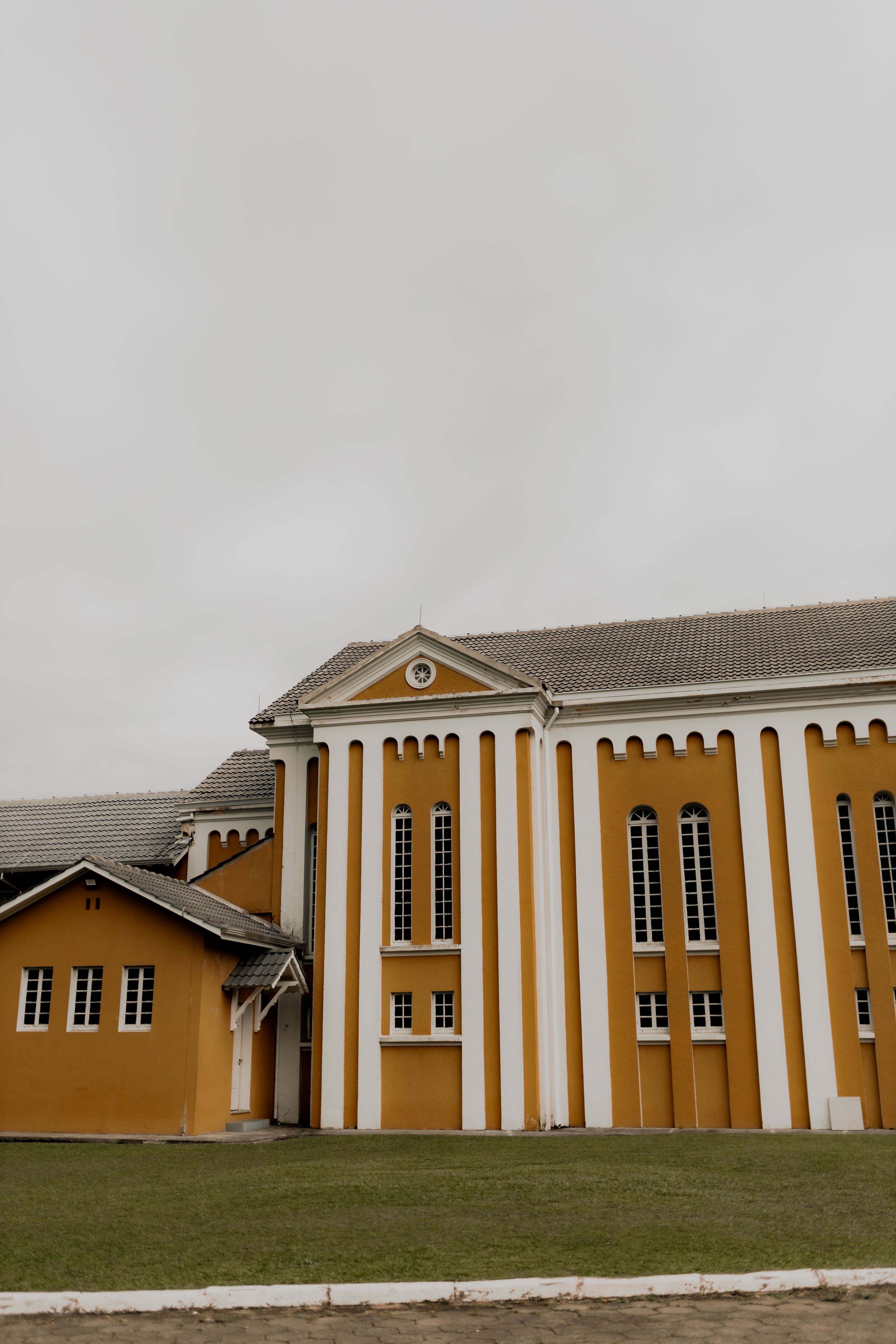 Classic Architecture of a Yellow Historic Building · Free Stock Photo