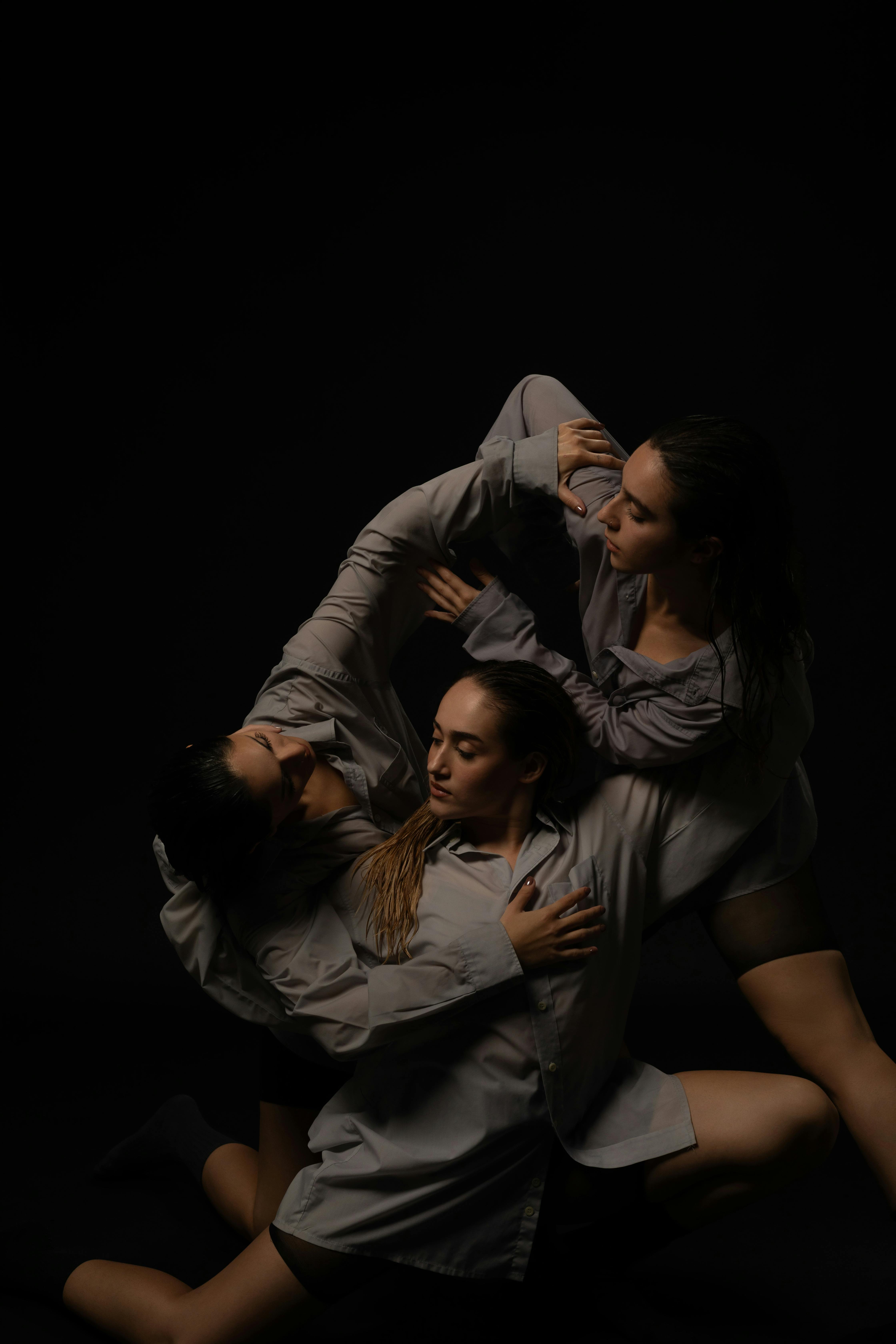 Elegant Contemporary Dance Pose in Dim Lighting · Free Stock Photo