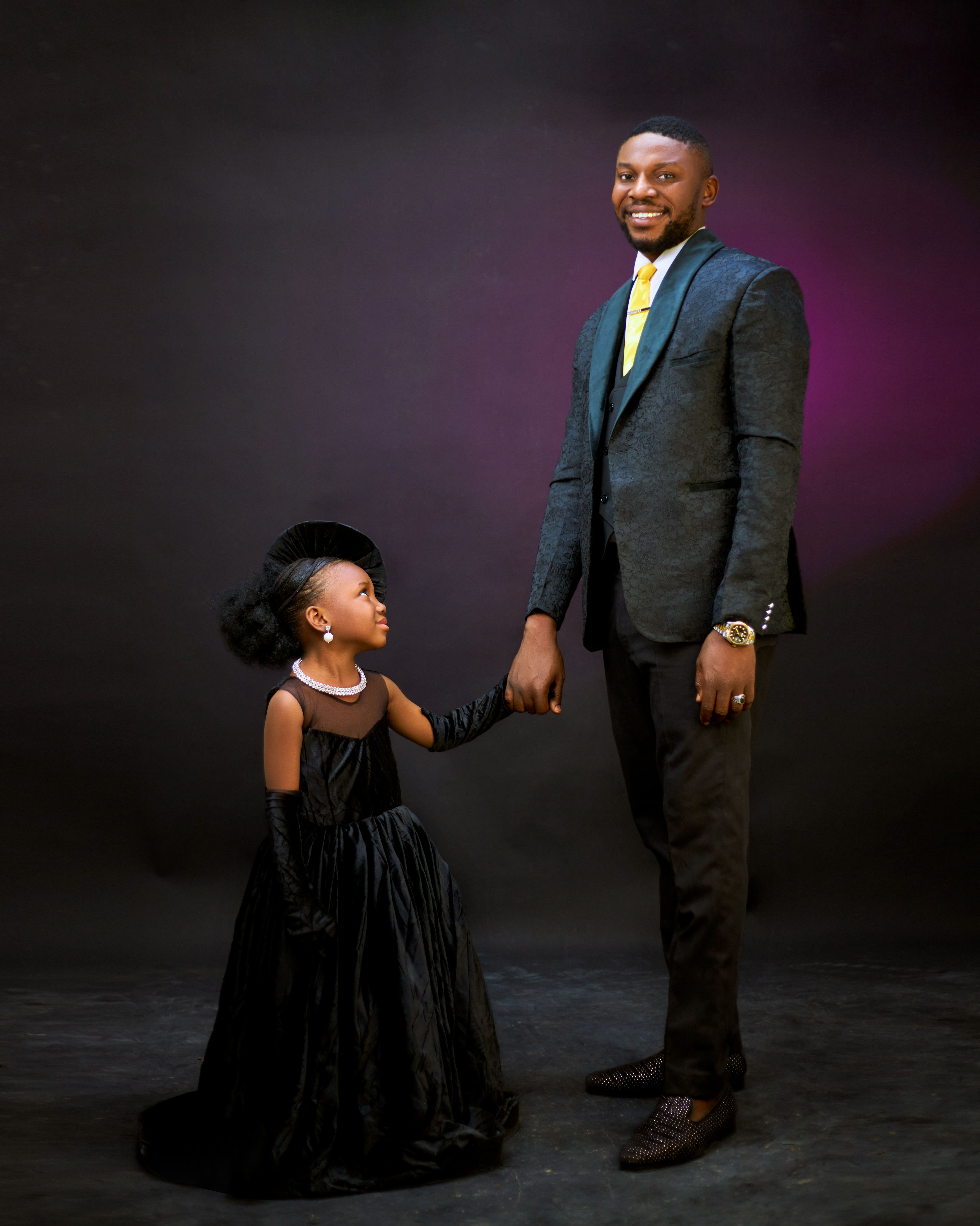 Elegant Father and Daughter in Formal Attire · Free Stock Photo