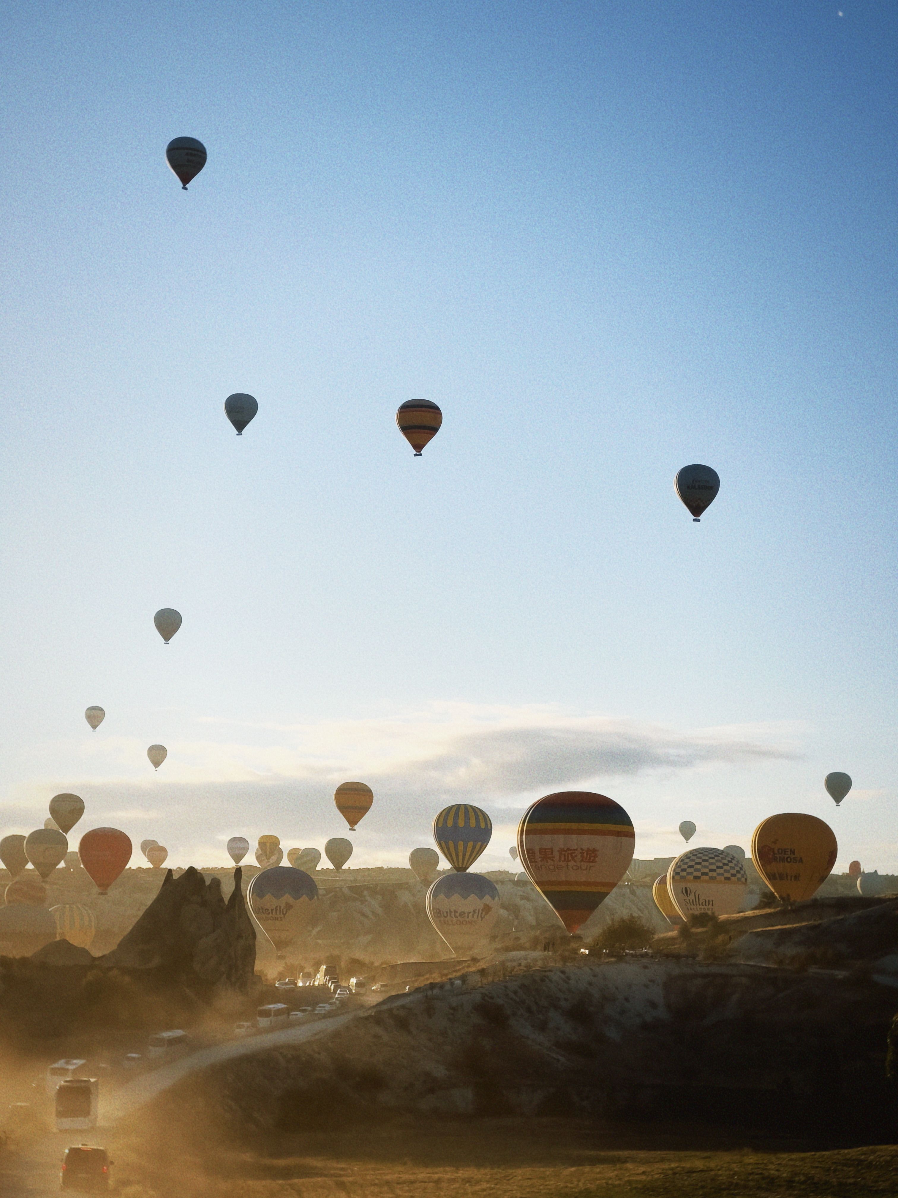 Hot Air Balloons Over Cappadocia at Sunrise · Free Stock Photo