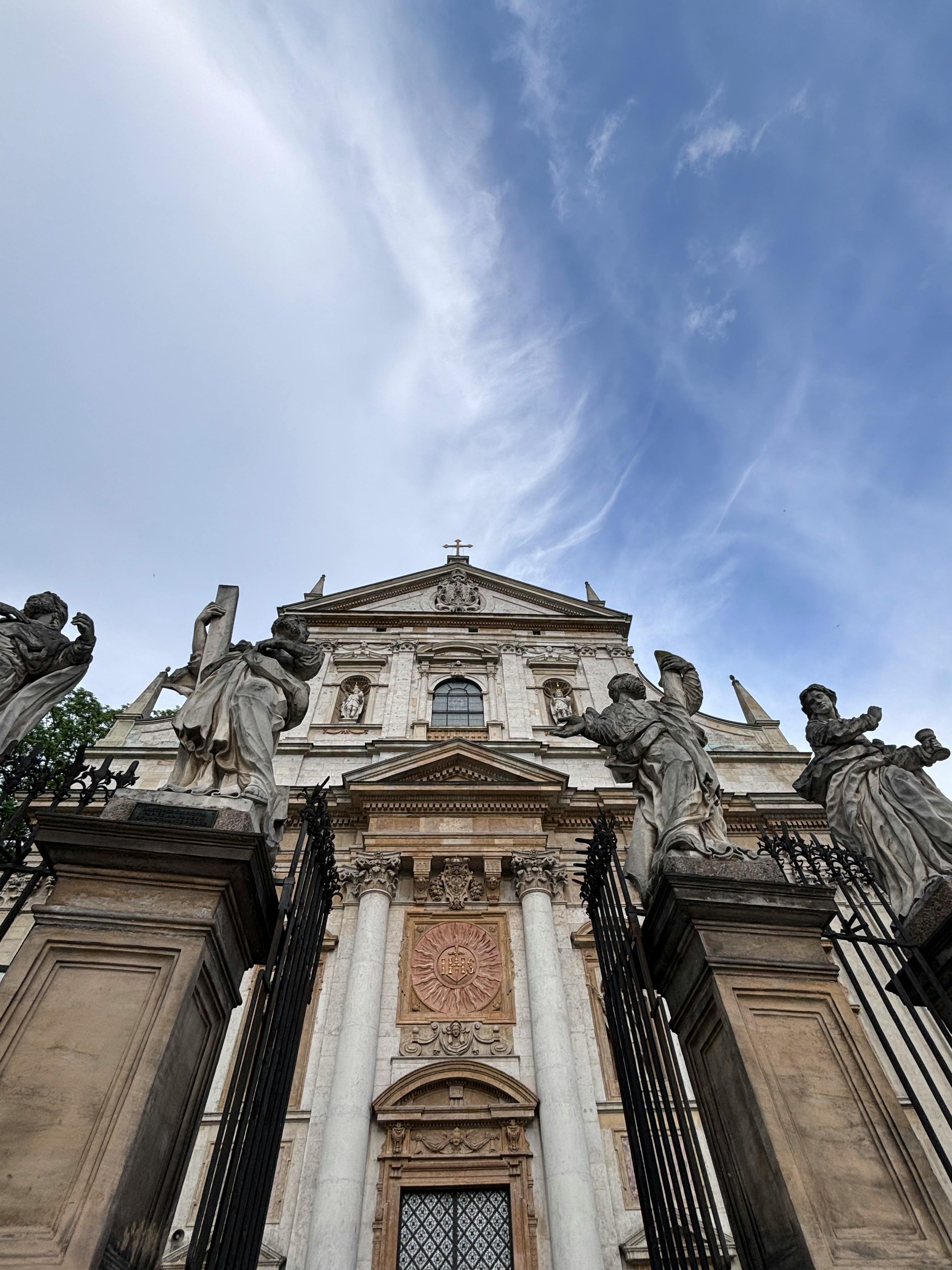 Ornate Historic Church with Classical Statues · Free Stock Photo