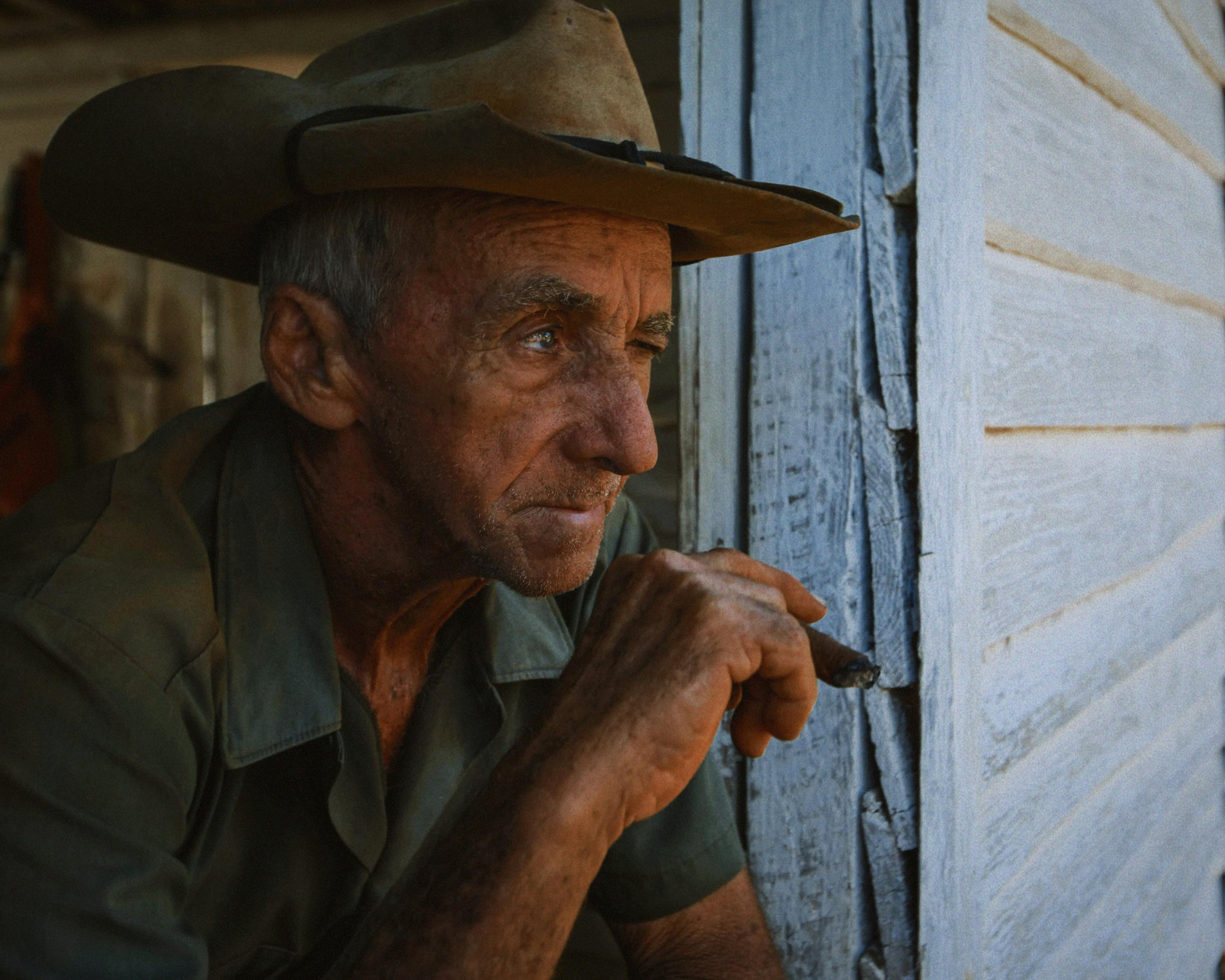 Elderly Farmer Contemplating Outdoors · Free Stock Photo