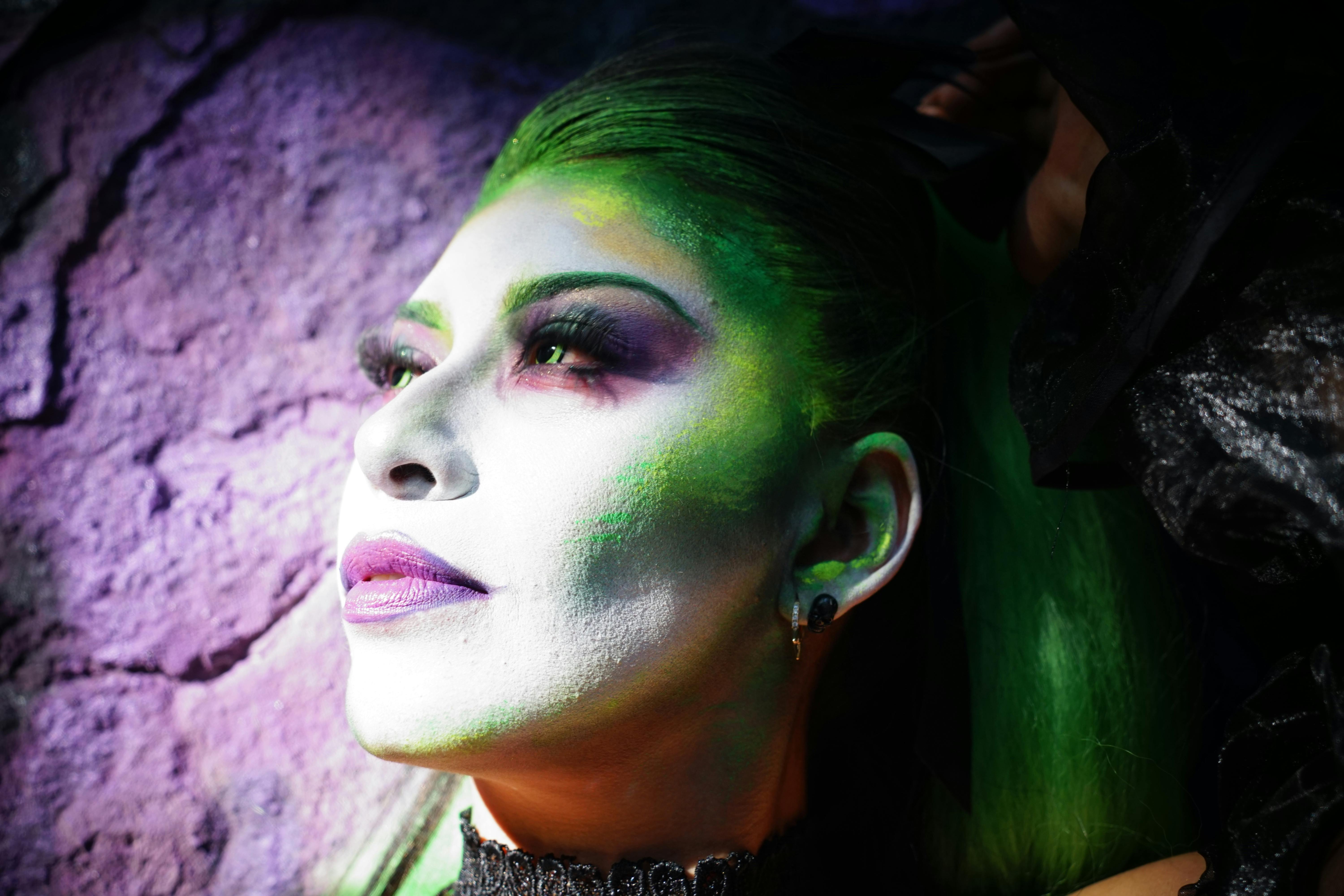 Vivid Face Painting in Creative Portrait Lighting · Free Stock Photo