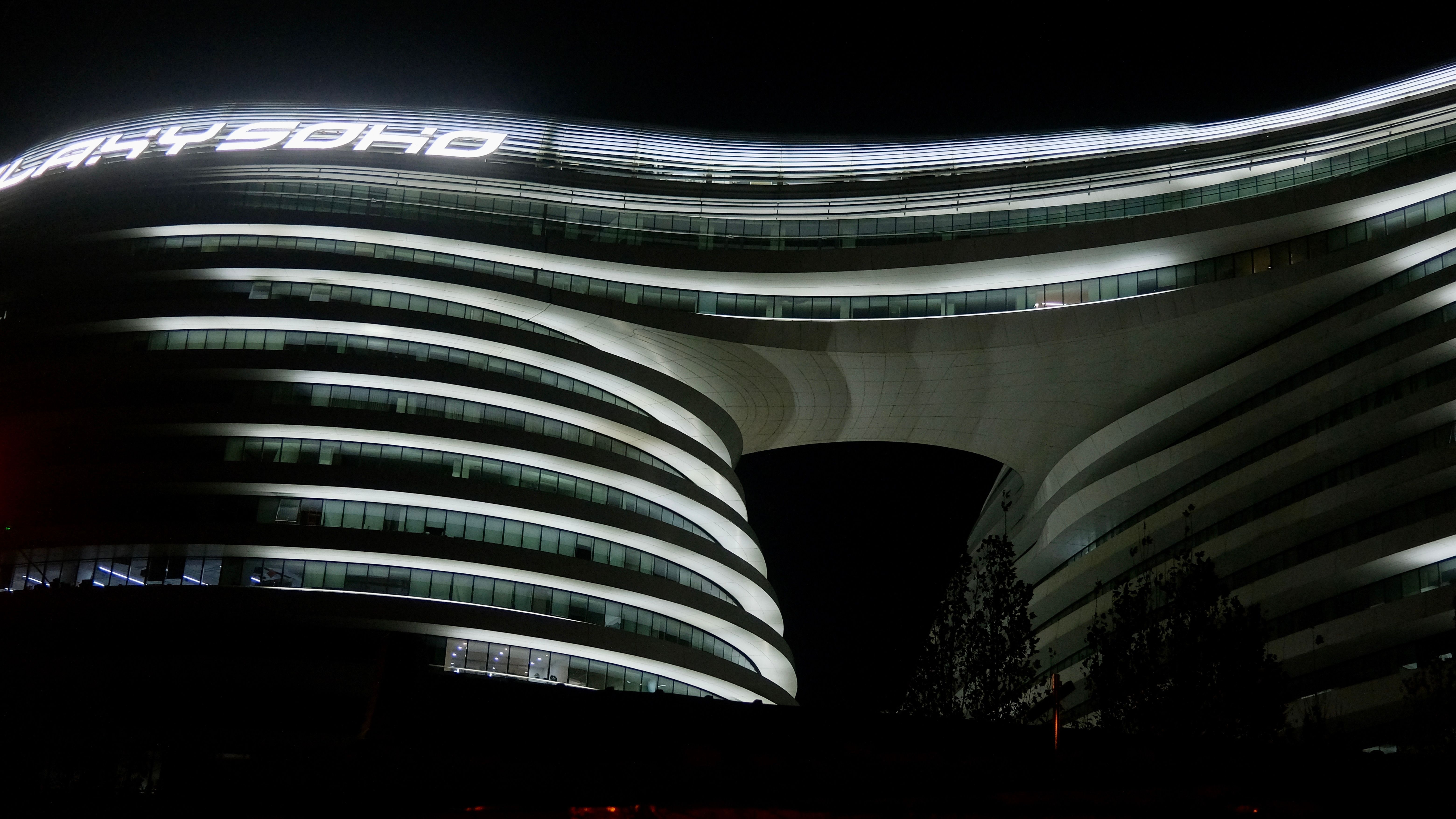 Modern Architecture at Night: Futuristic Building · Free Stock Photo