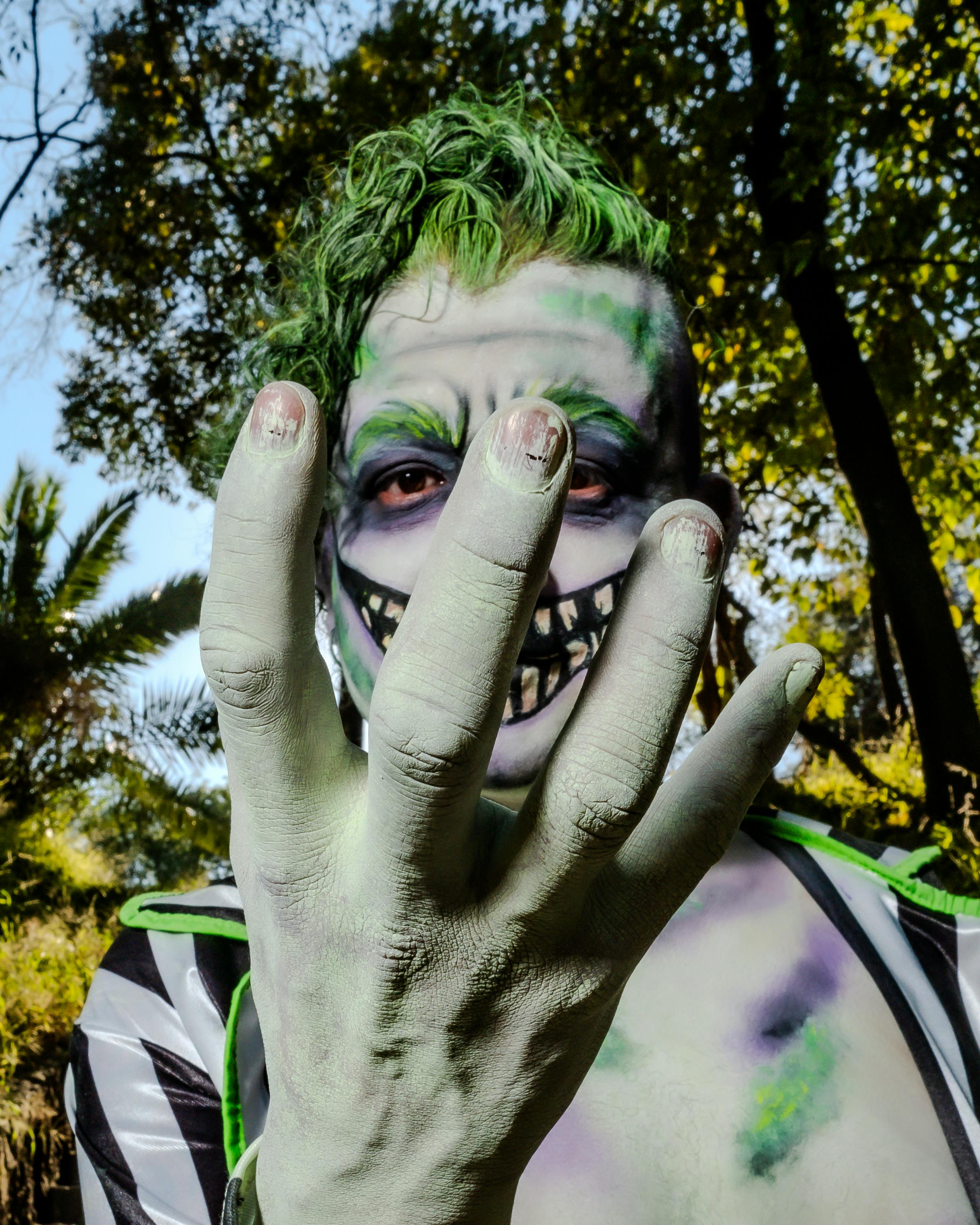 Dramatic Surreal Portrait with Horror Makeup Outdoors · Free Stock Photo