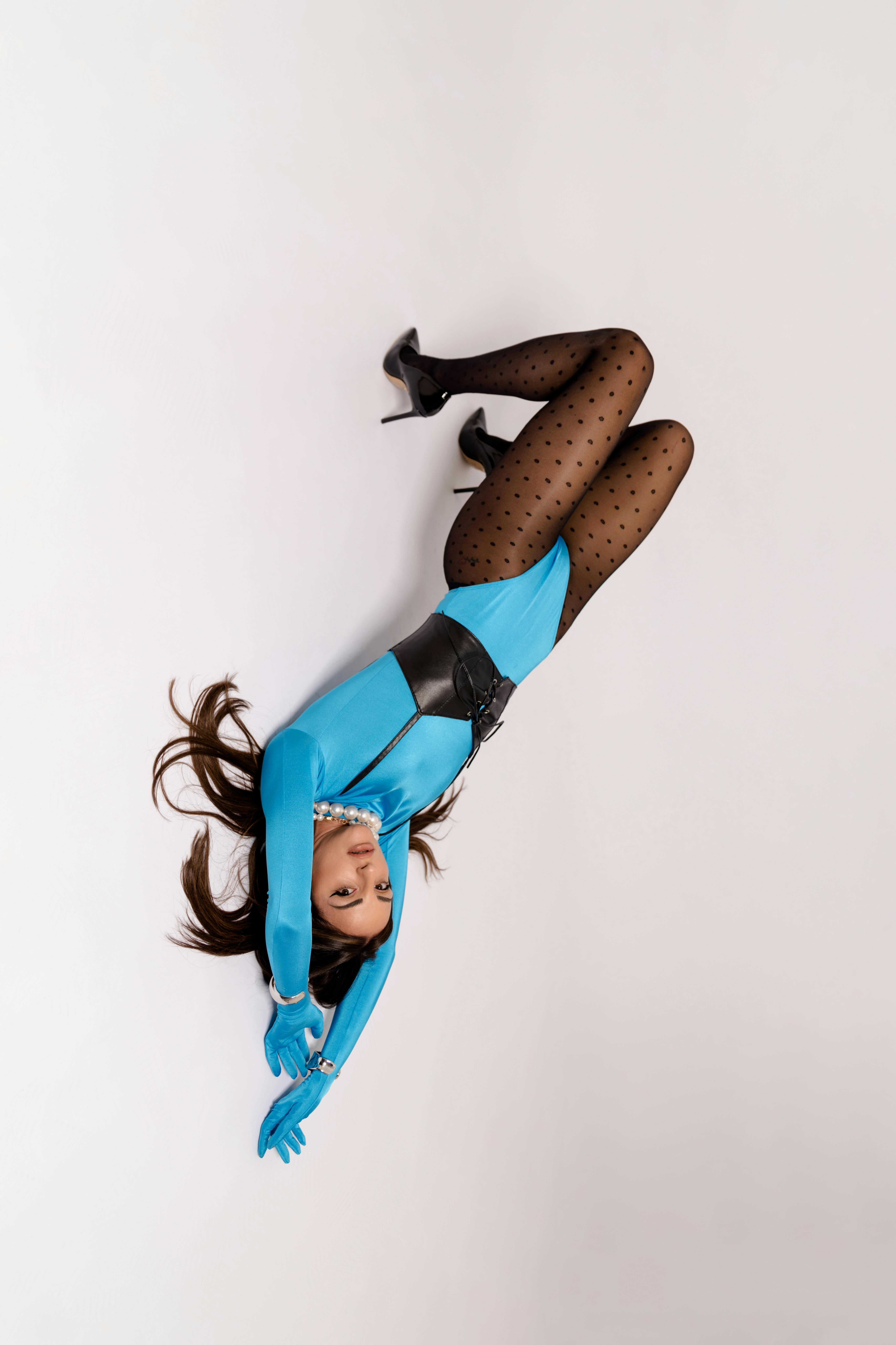 Dynamic Fashion Model in Blue Outfit Pose · Free Stock Photo