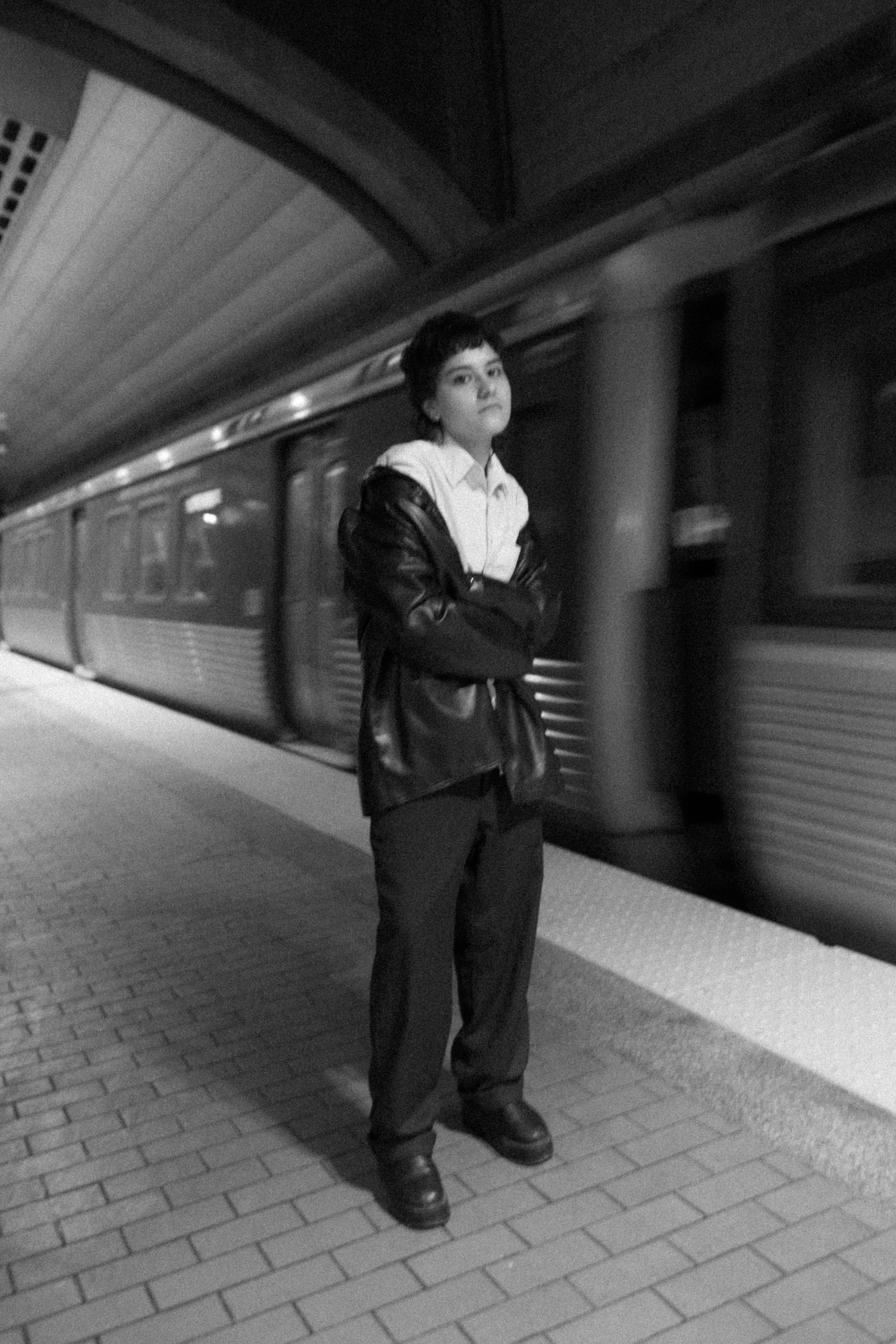 Person Waiting at Train Station in Motion Blur · Free Stock Photo