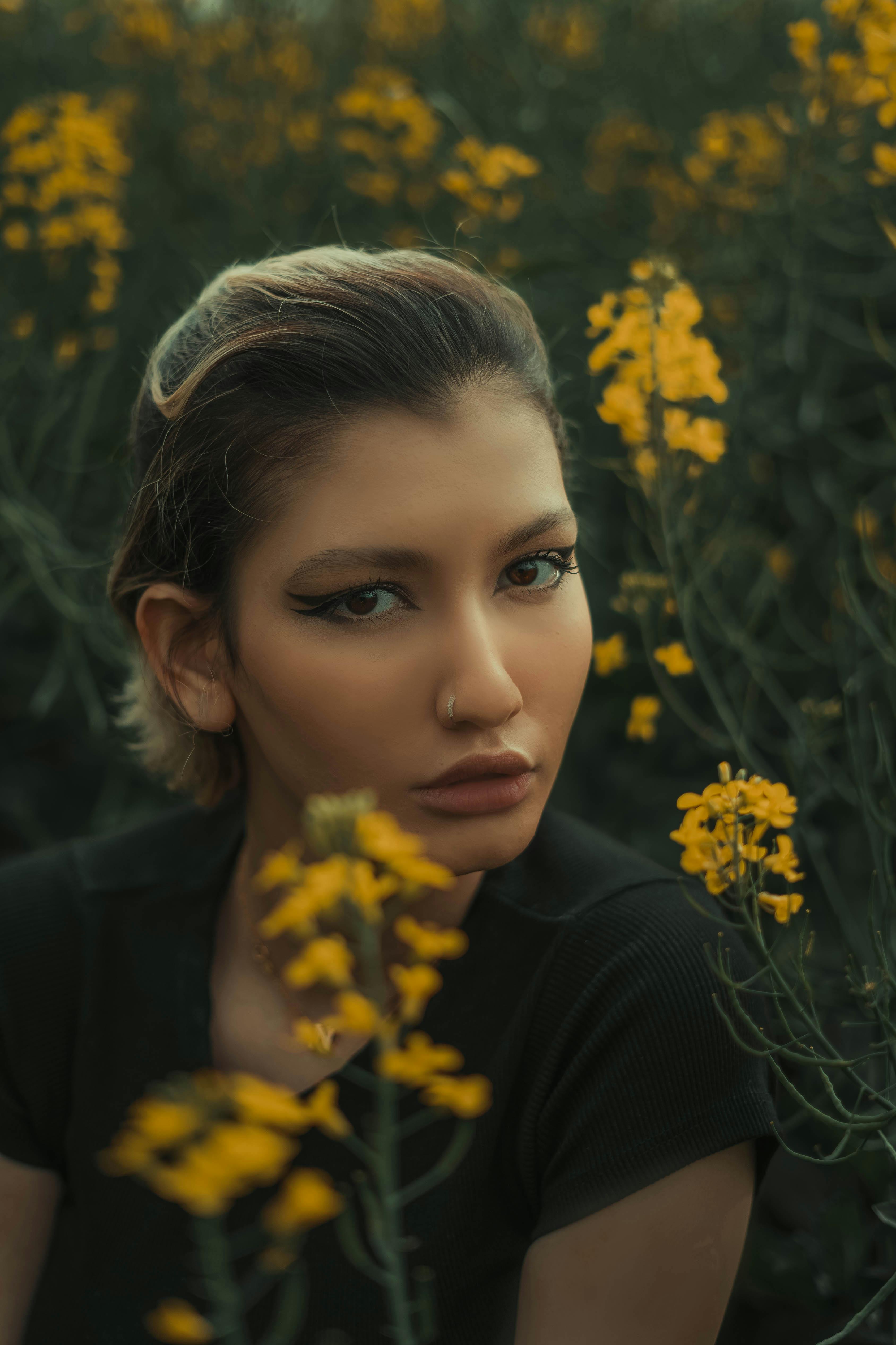 Young Woman in Flower Field Portrait · Free Stock Photo