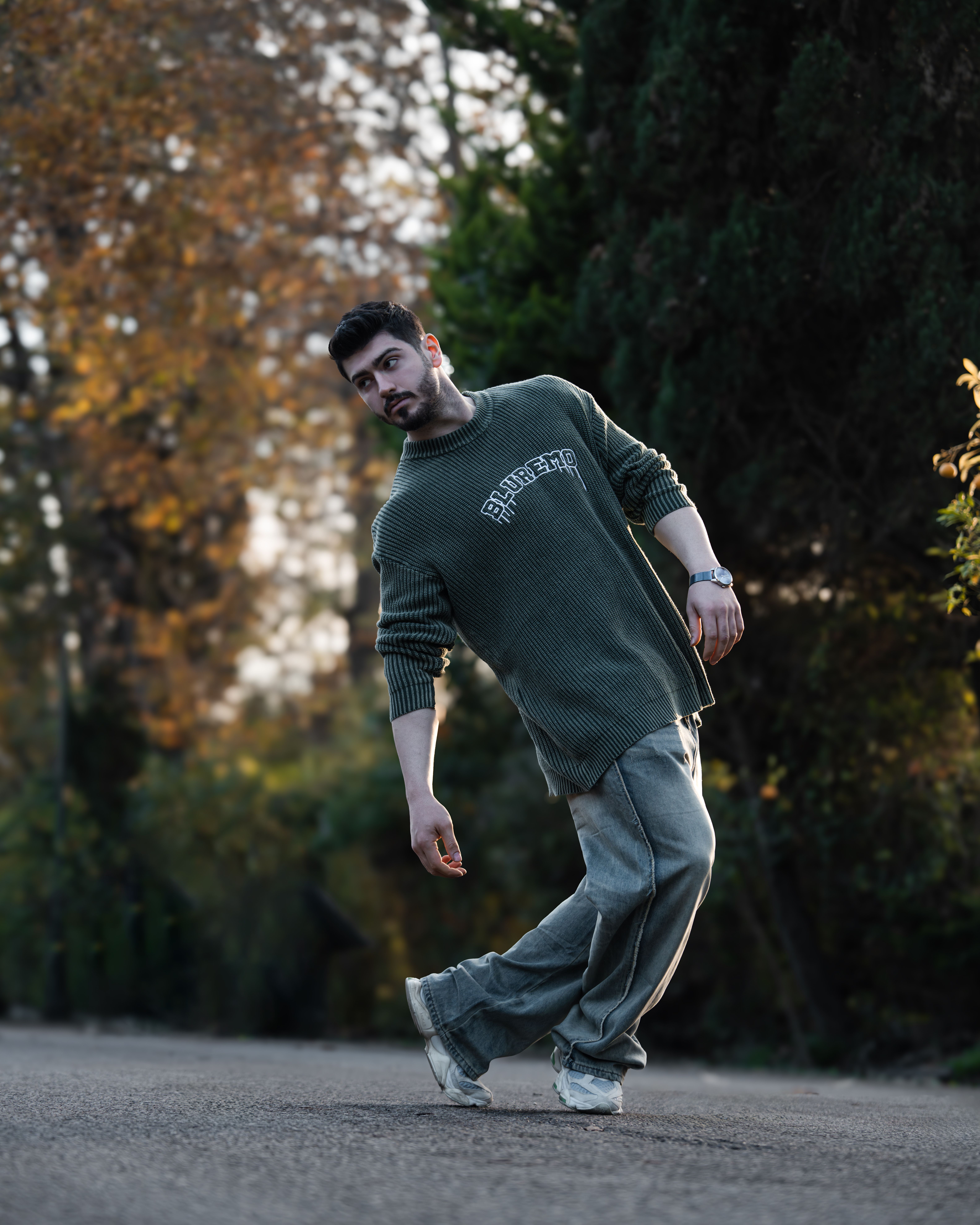 Stylish Man Posing Outdoors in Autumn · Free Stock Photo