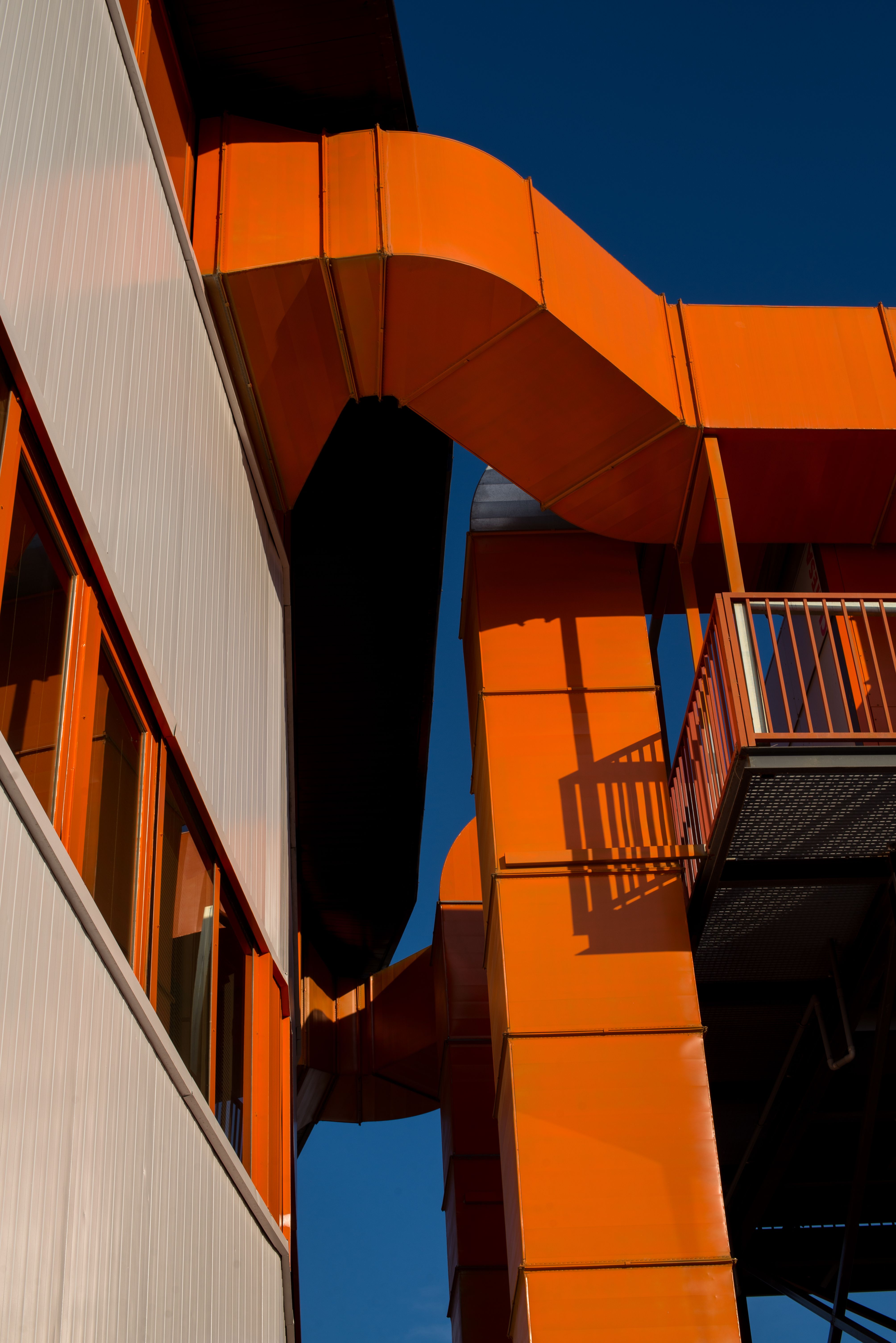 Modern Architecture with Bold Orange Design · Free Stock Photo