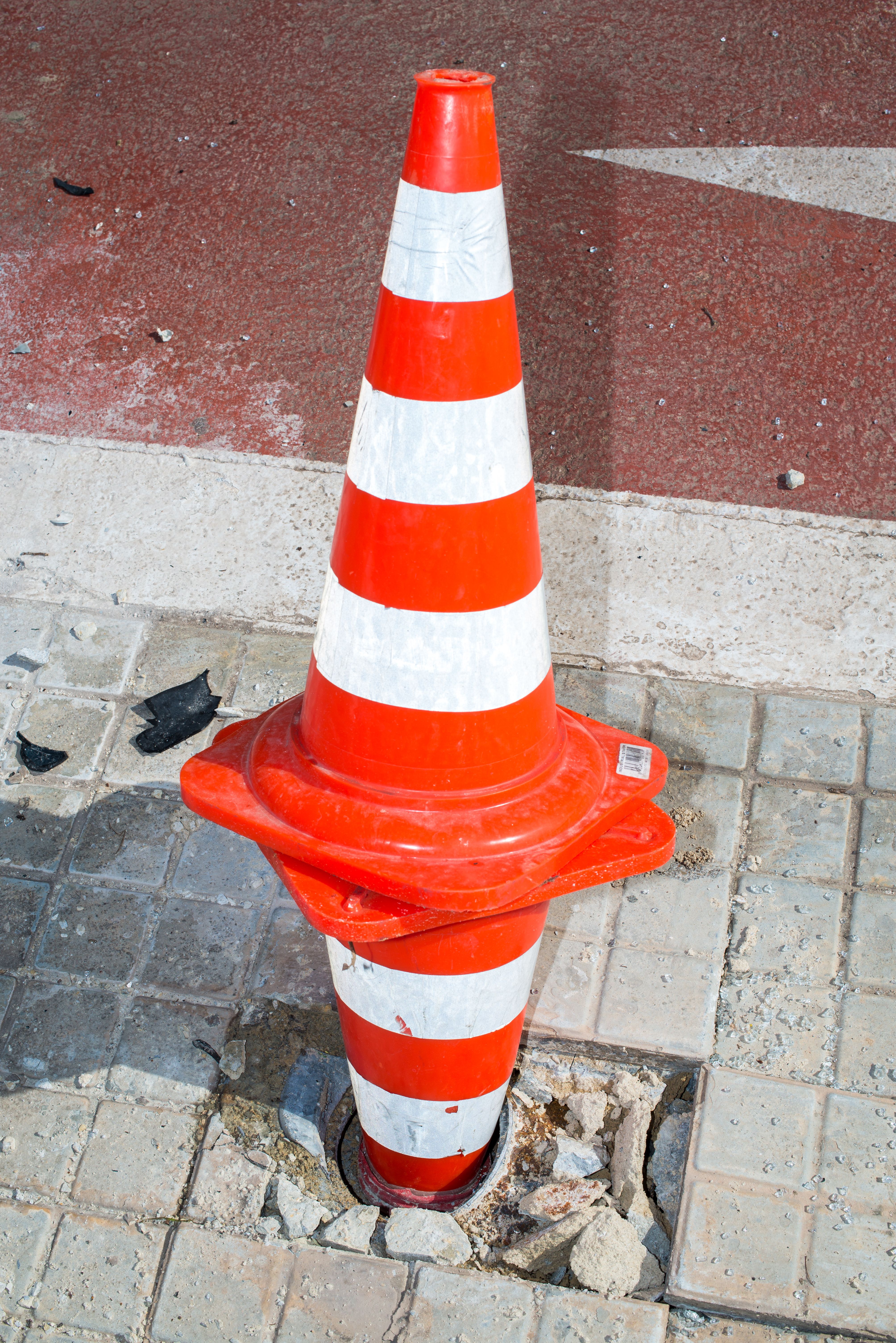 Close-Up of a Traffic Cone on Pavement · Free Stock Photo