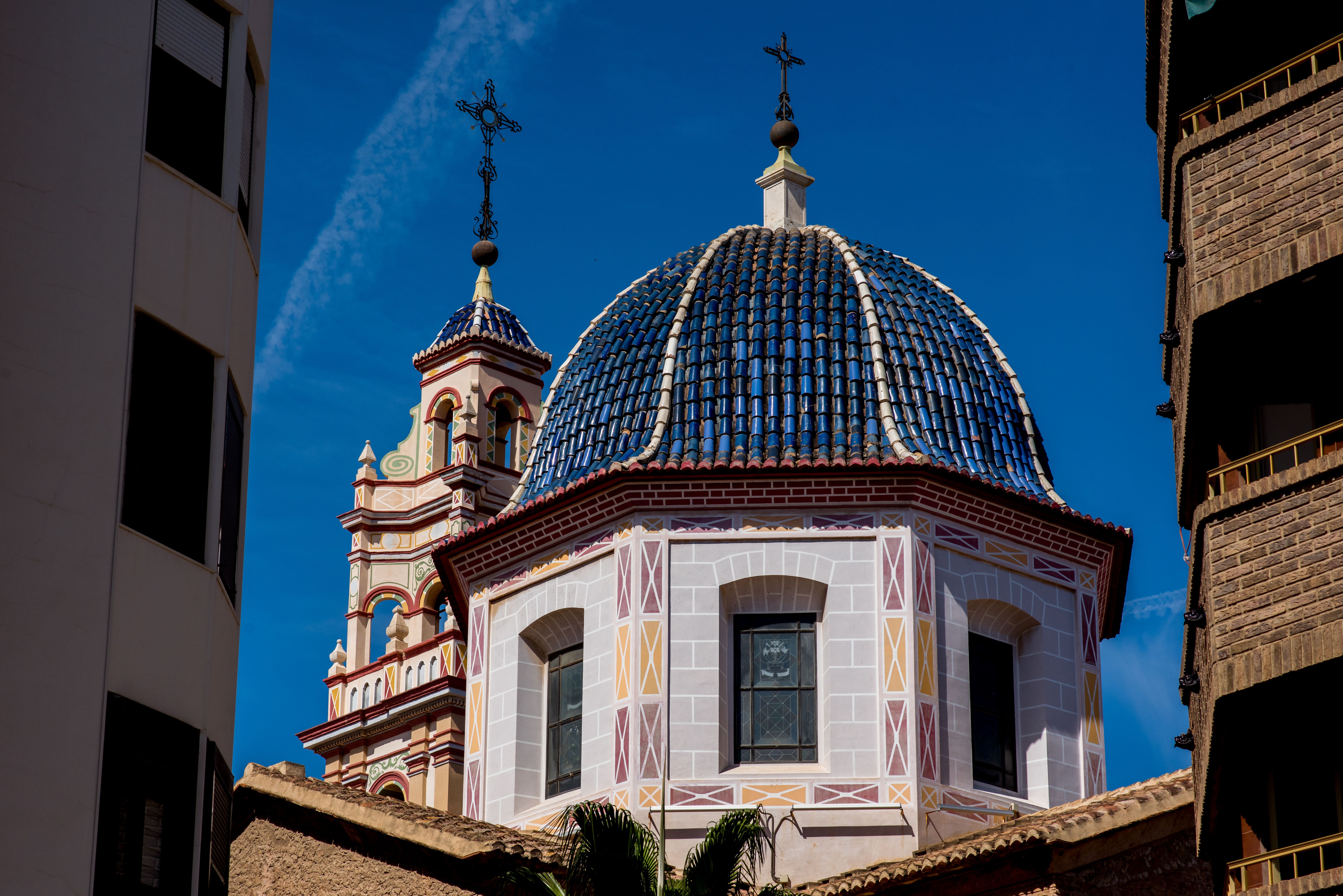Beautiful Spanish Dome Against Blue Sky · Free Stock Photo