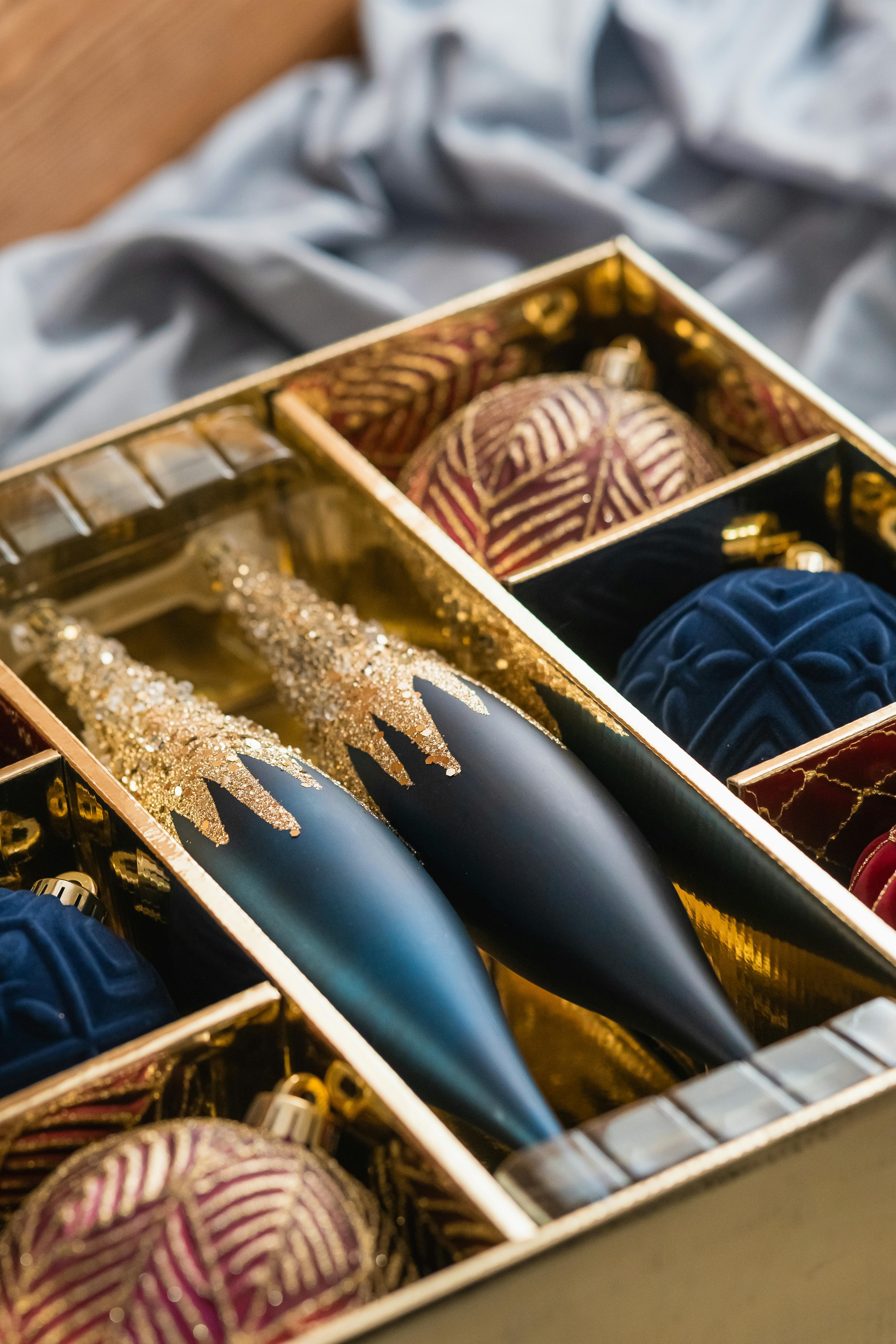 Elegant Box of Christmas Ornaments Close-Up · Free Stock Photo