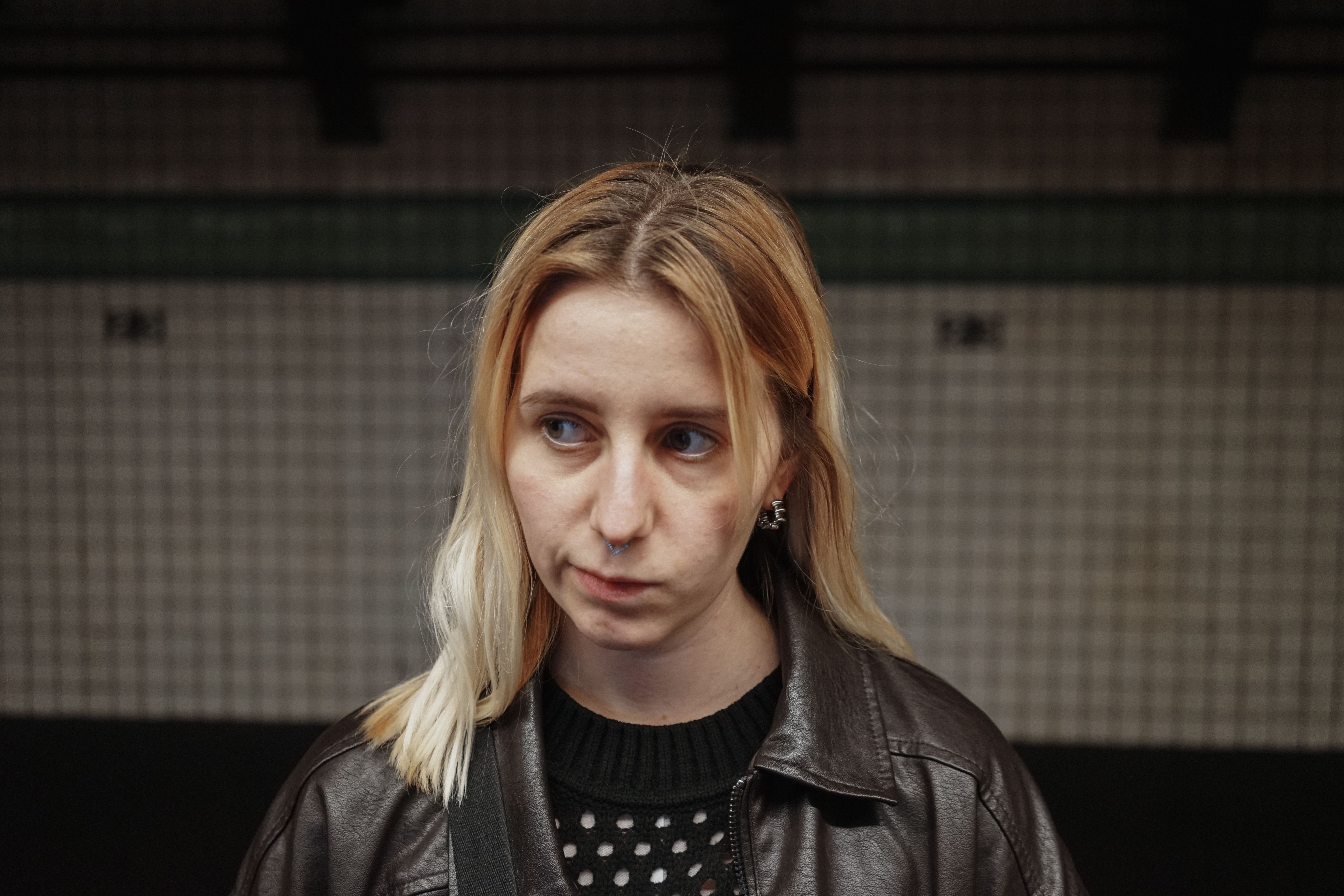 Young Woman in Urban Subway Setting · Free Stock Photo