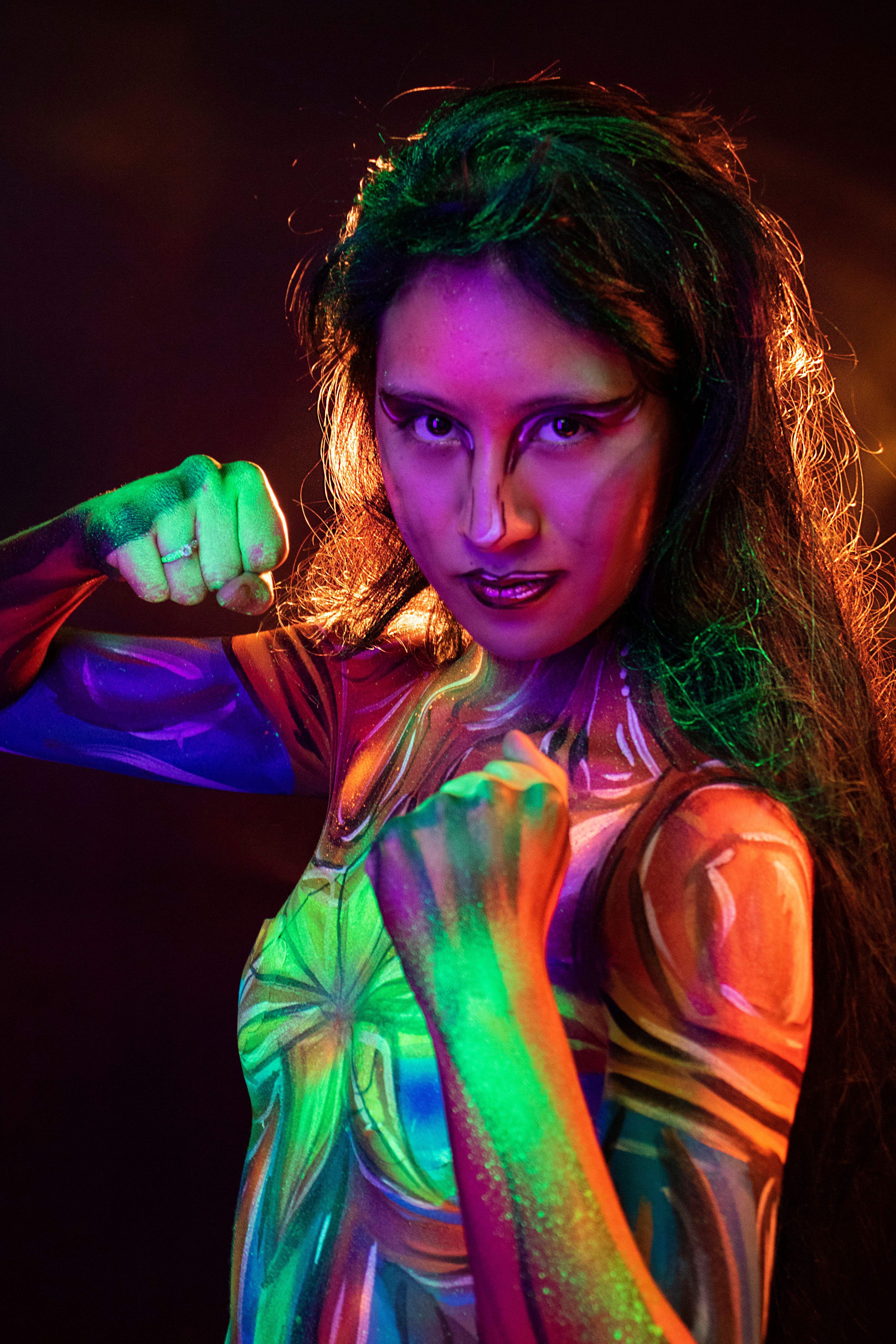 Vibrant Body Art Portrait of Strong Woman · Free Stock Photo